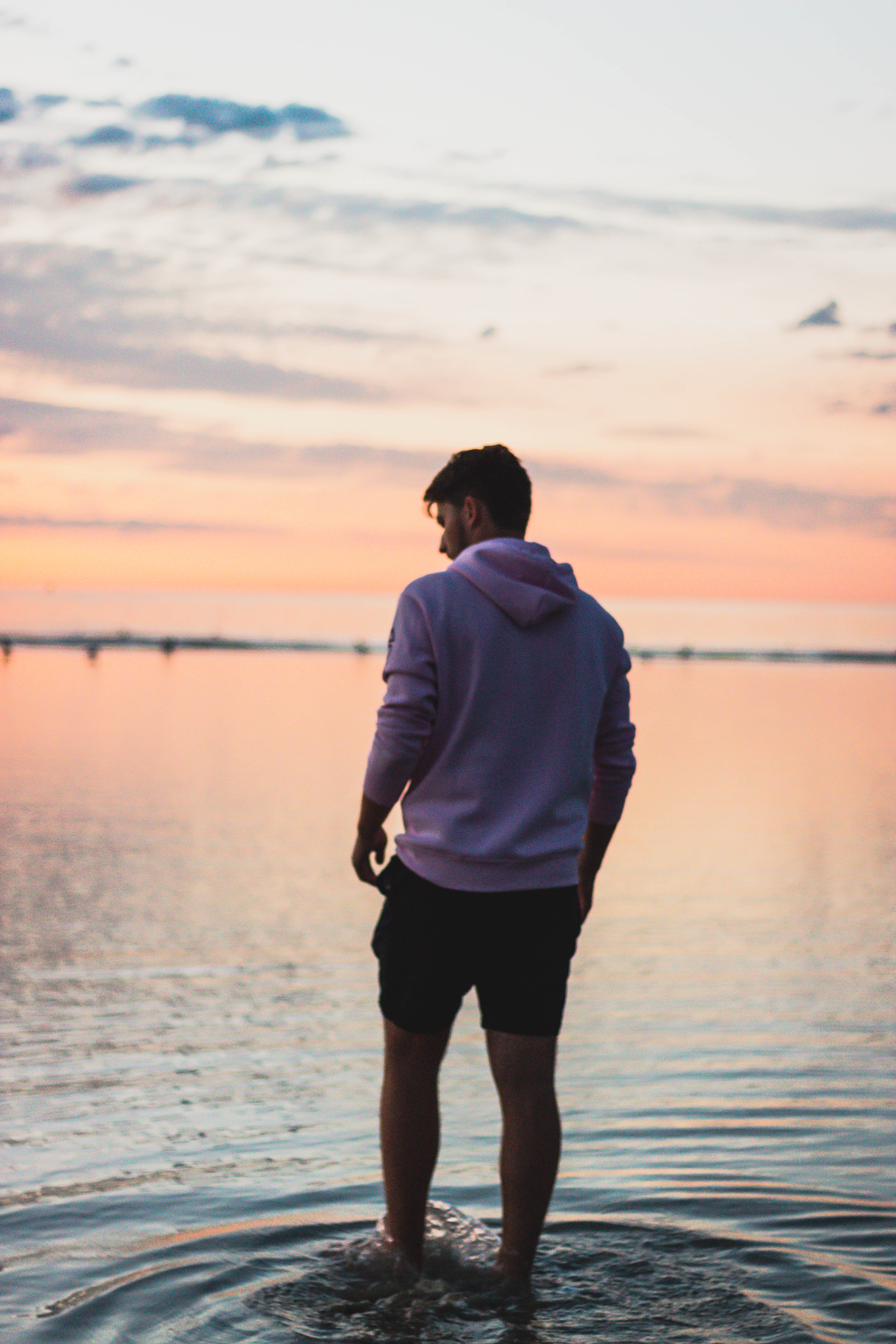 Man Standing In Water