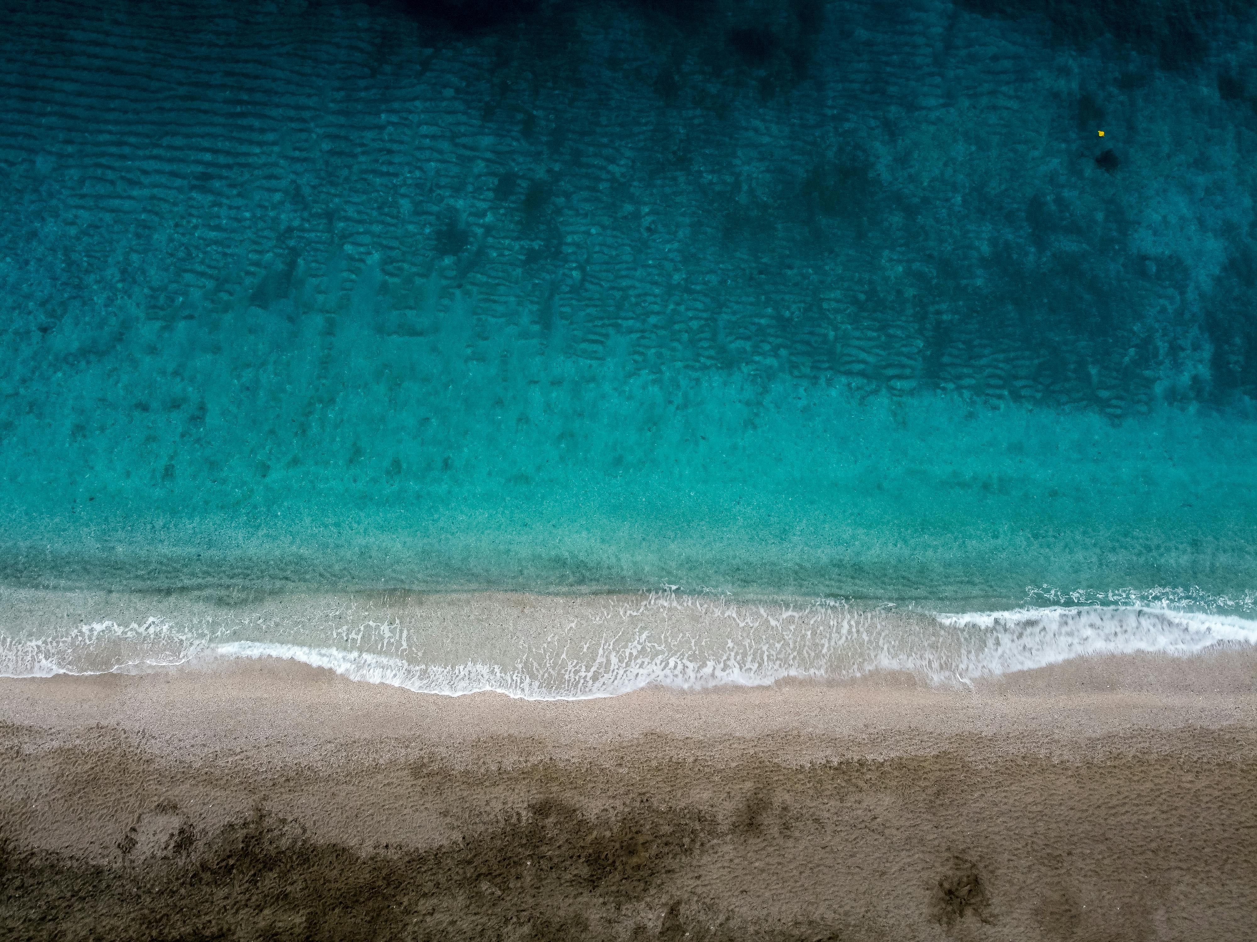 Aerial Photography of Ocean Shore · Free Stock Photo