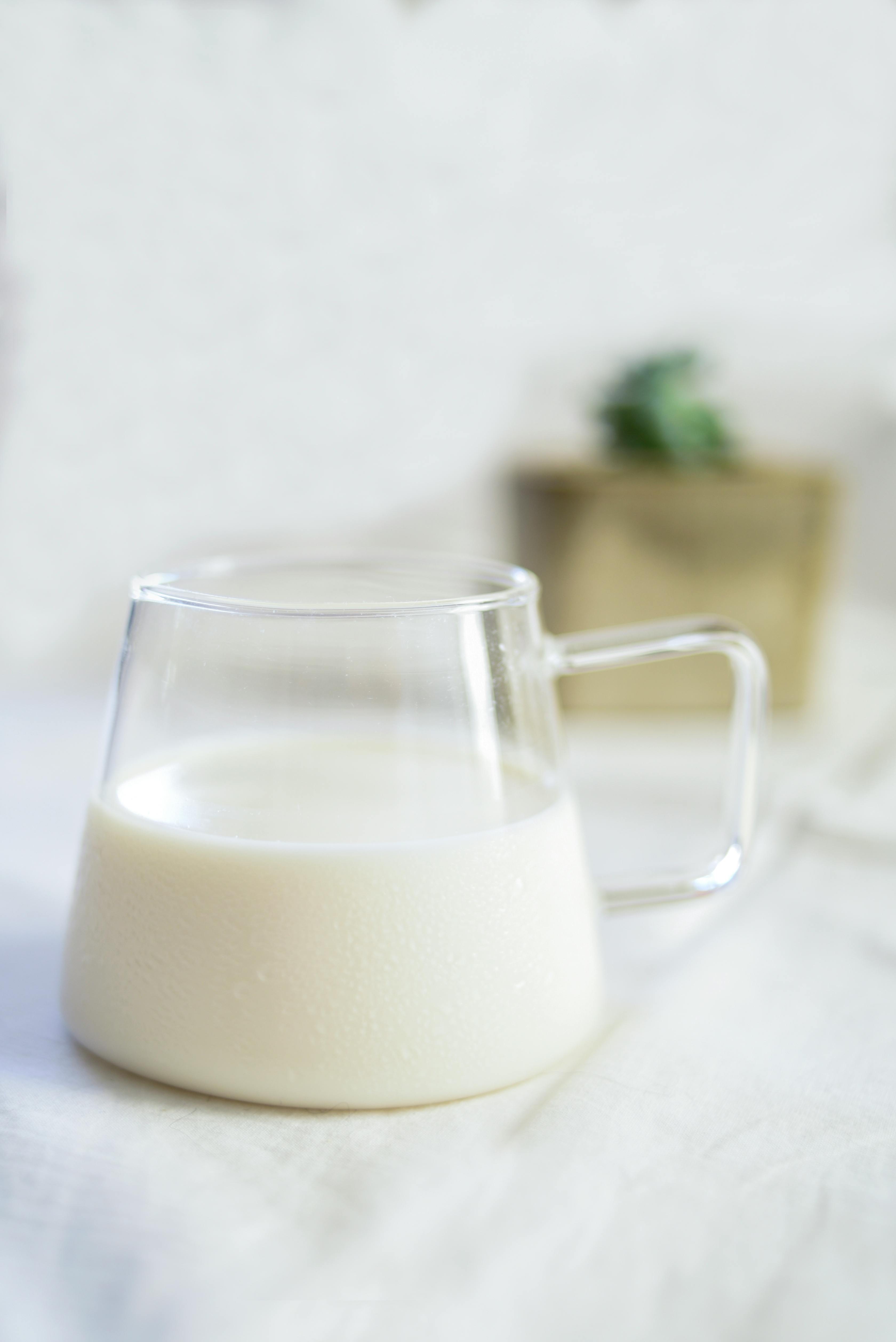 Clear Glass Mug With Milk Inside · Free Stock Photo