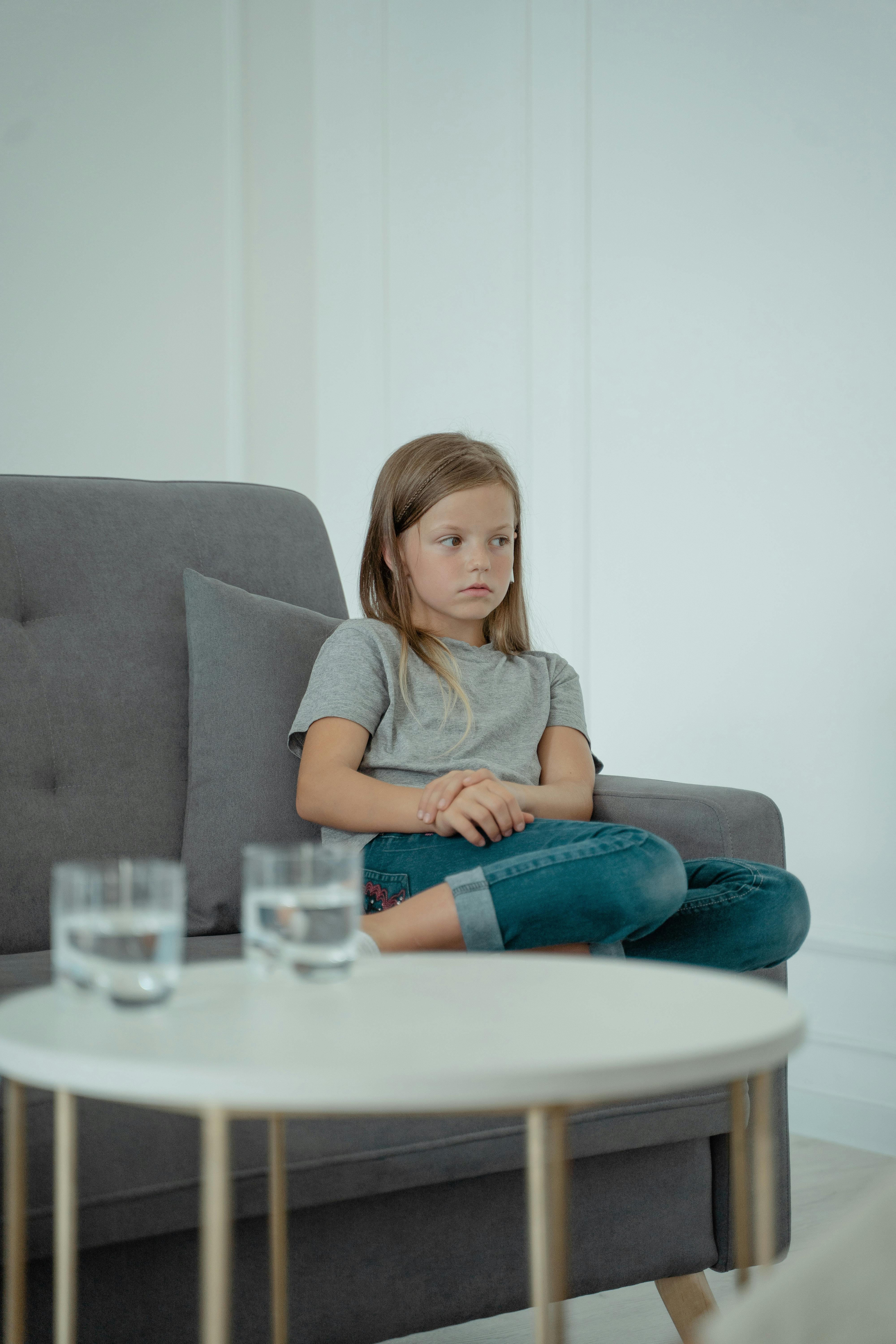 Photo of Girl Sitting on Chair · Free Stock Photo
