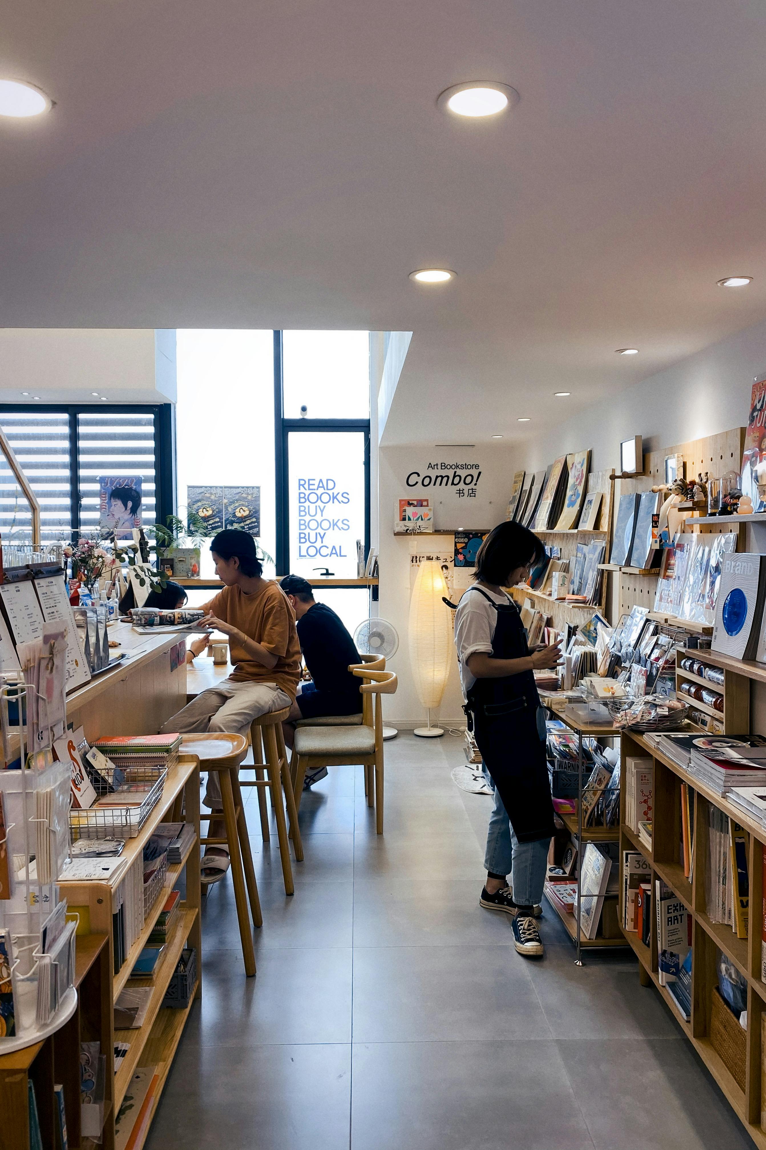 People Inside a Bookstore · Free Stock Photo