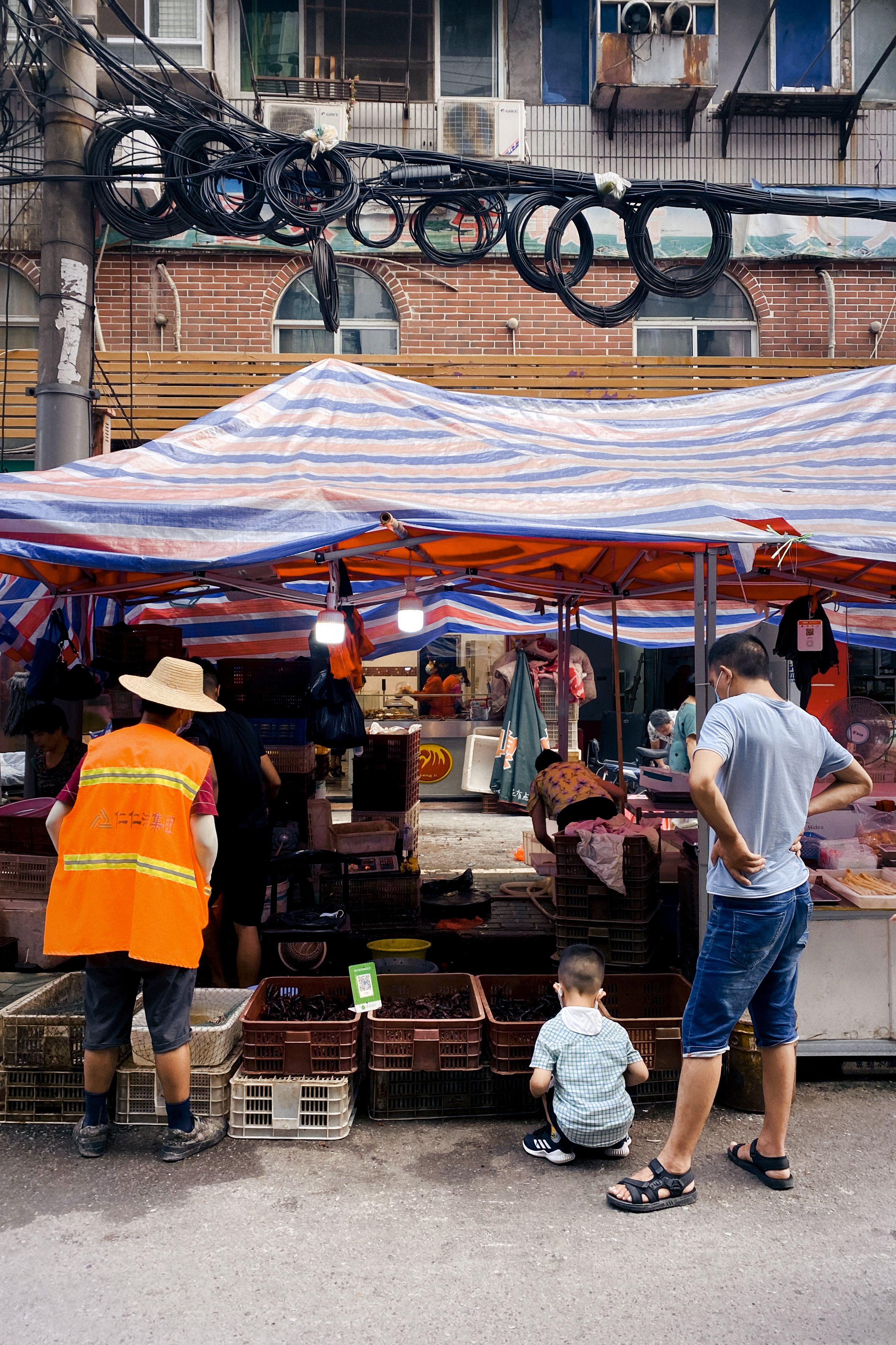 People Standing in Front of the Food Stall · Free Stock Photo