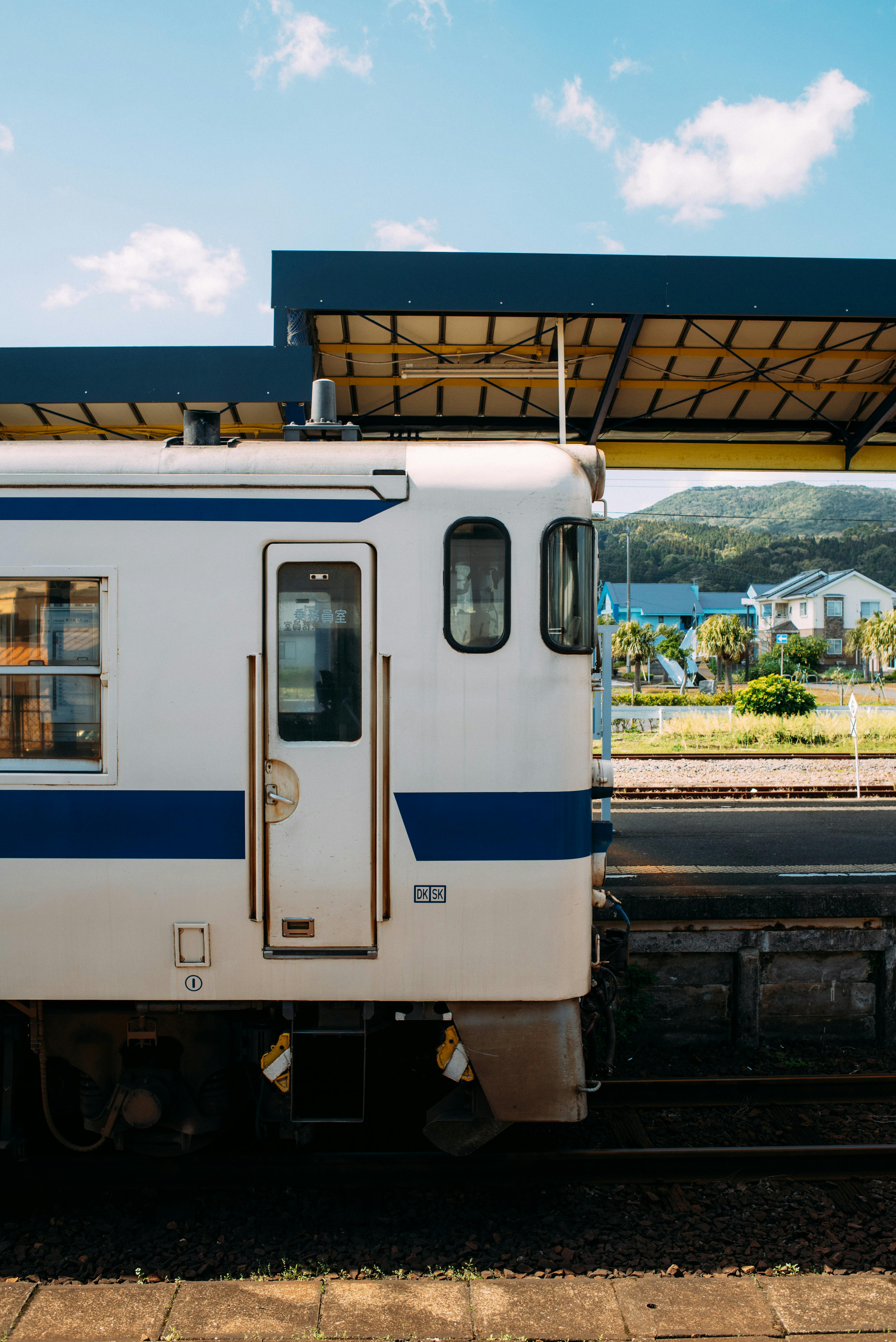 White Train on Rail Track · Free Stock Photo