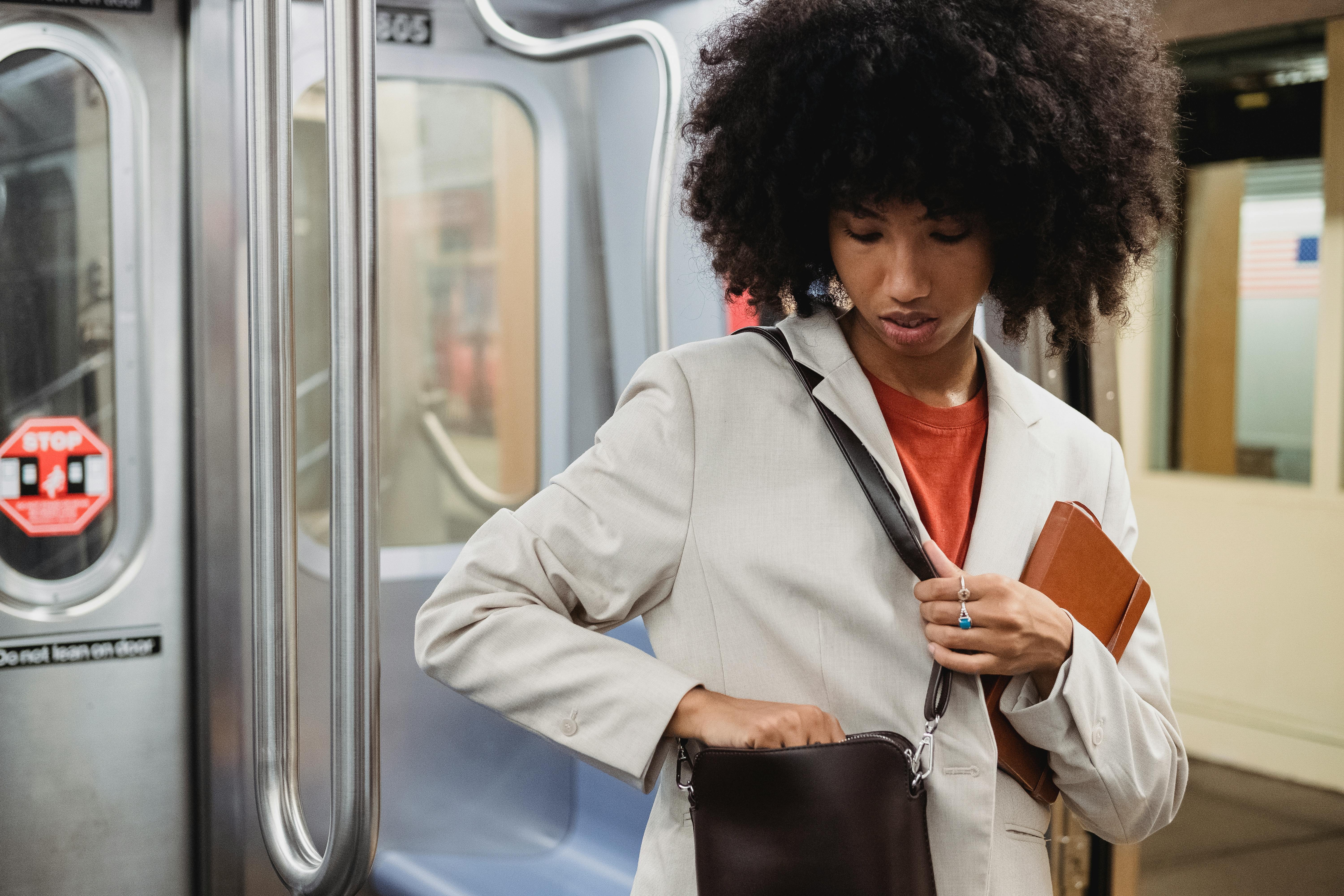 A Woman Standing Inside the Train · Free Stock Photo