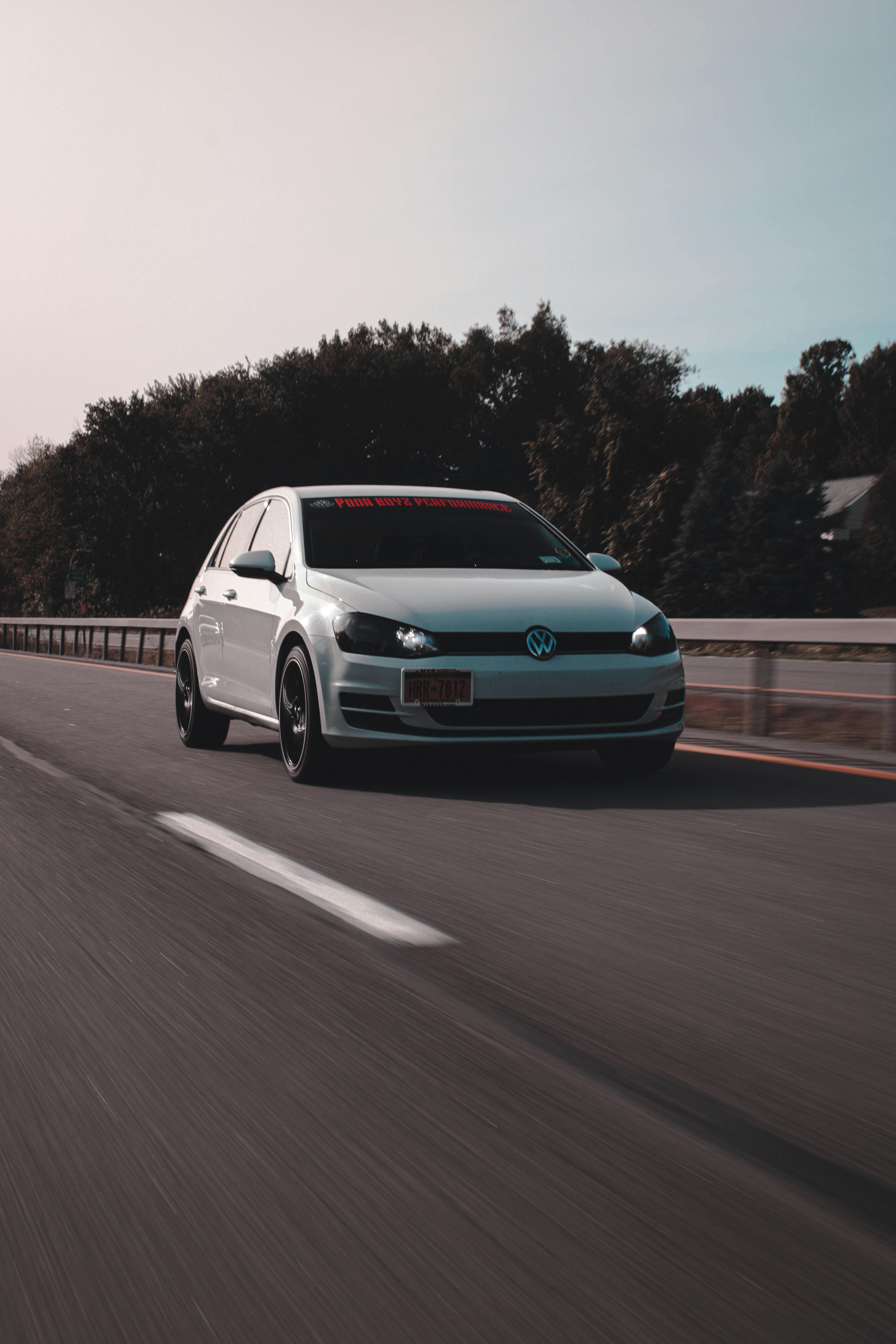Photo of a Silver Car on the Road · Free Stock Photo