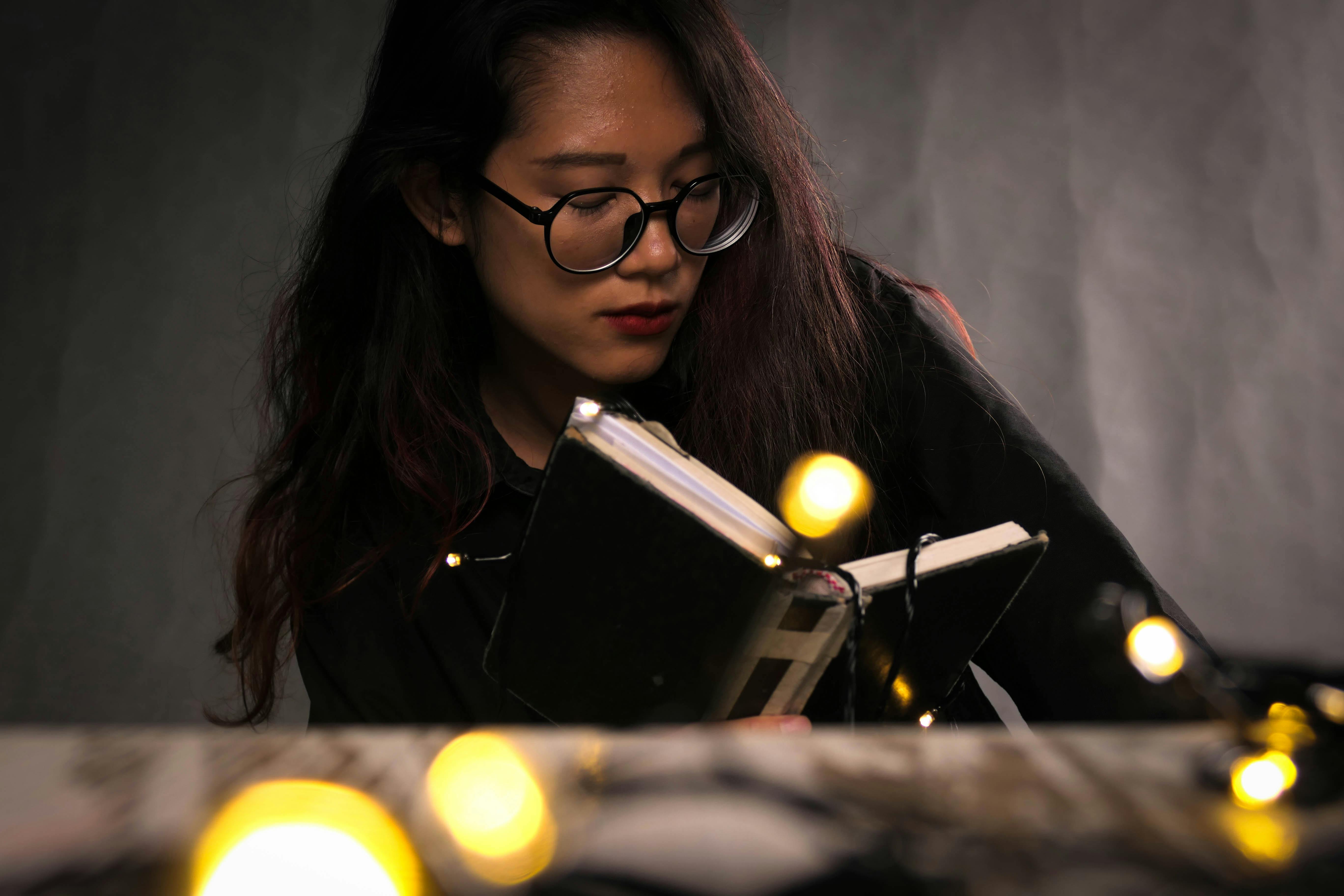 Person Holding a Book · Free Stock Photo