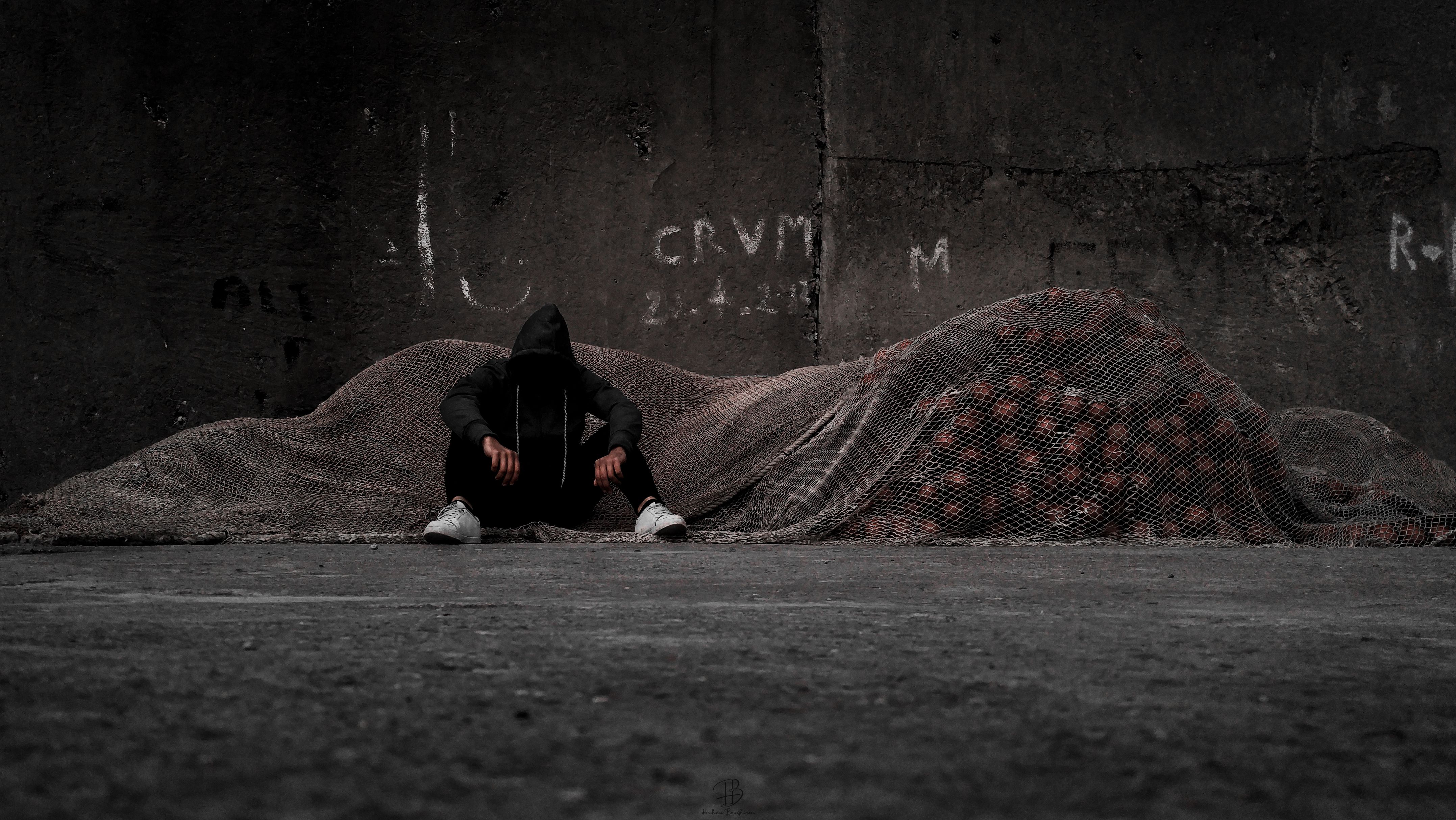 Homeless Man Sitting on the Concrete Stairs · Free Stock Photo