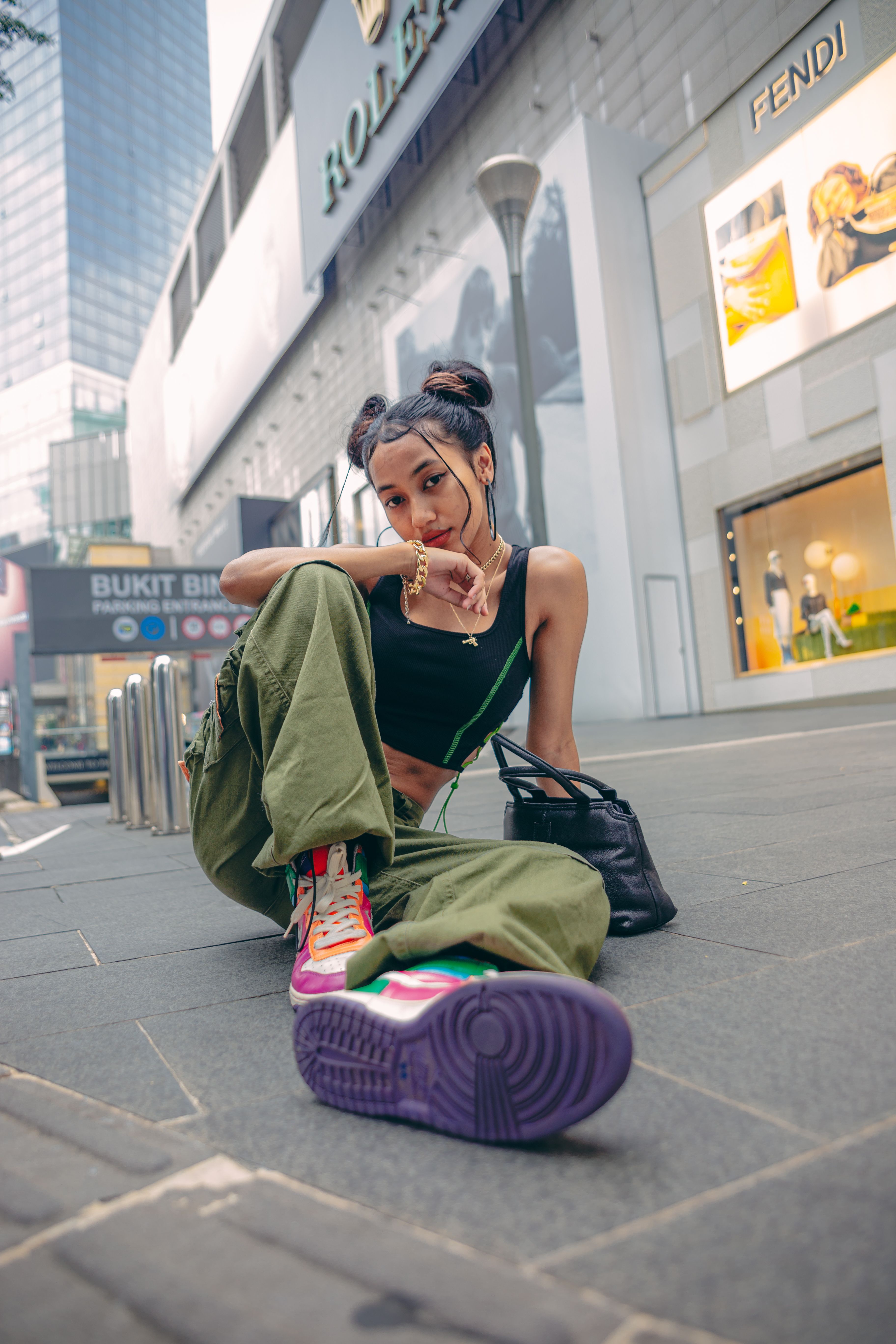 A Woman Wearing Black Shoes While Posing · Free Stock Photo