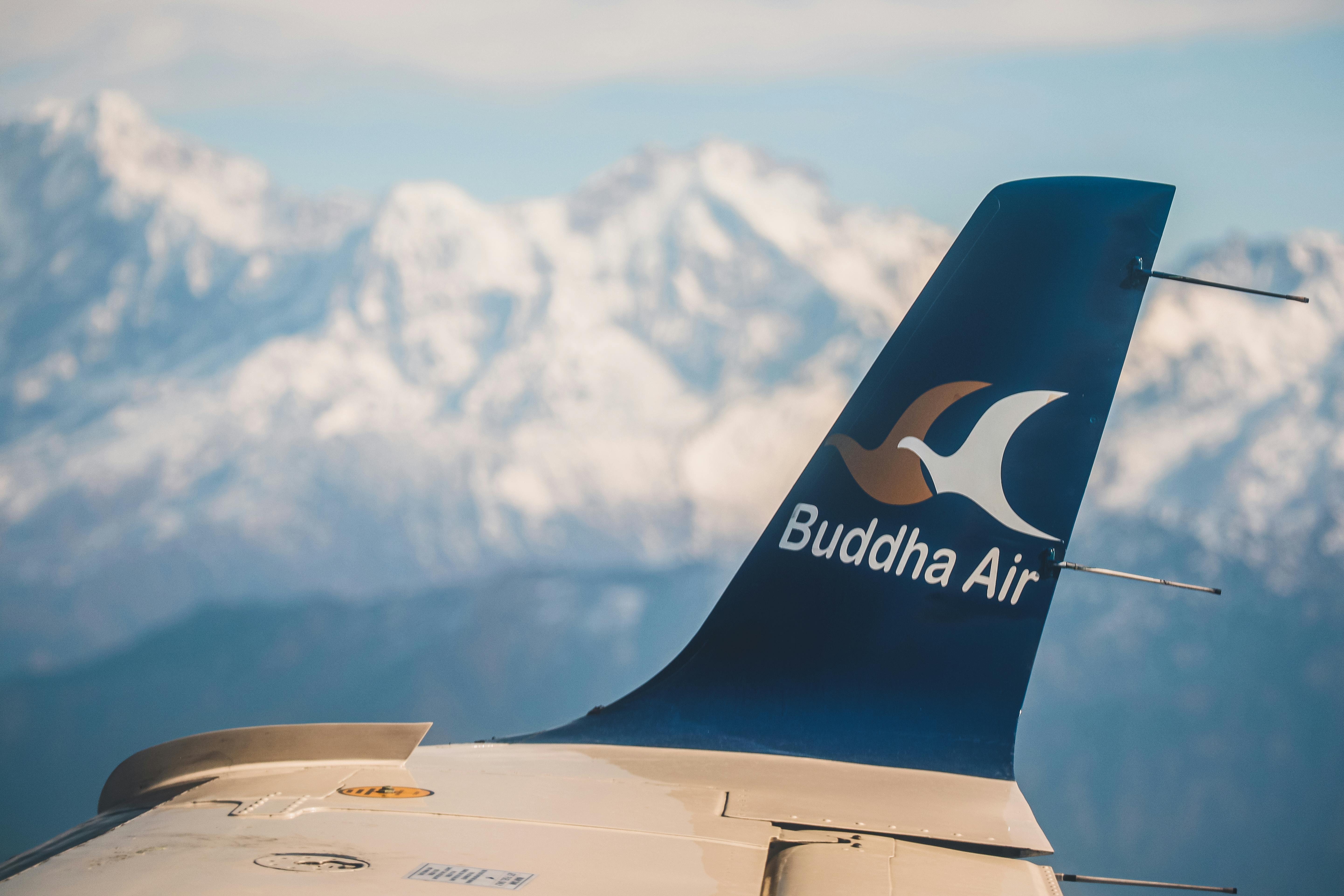 Blue and White Airplane Wing · Free Stock Photo