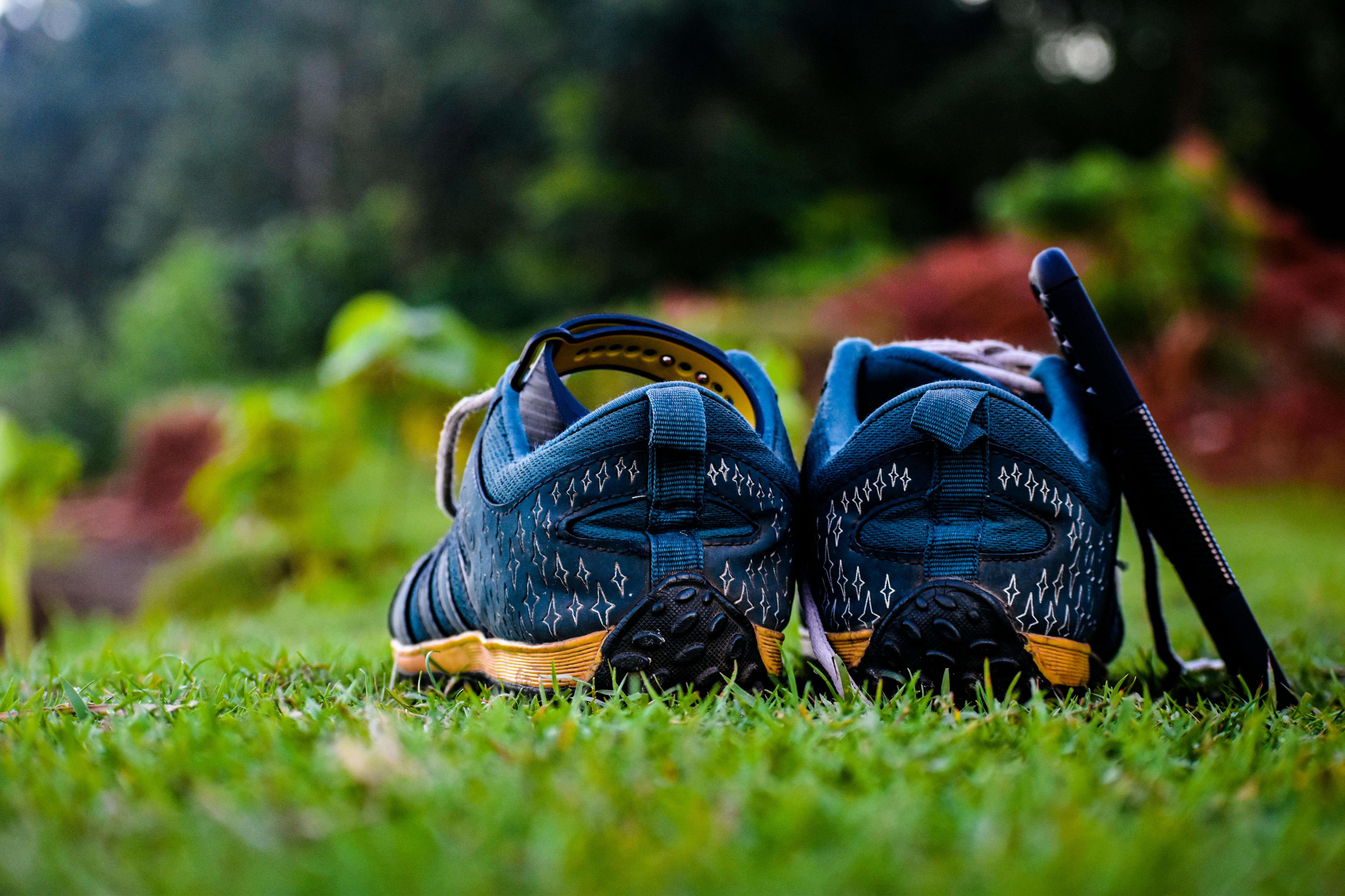 Close Up Photo of Blue Shoes on Grass · Free Stock Photo