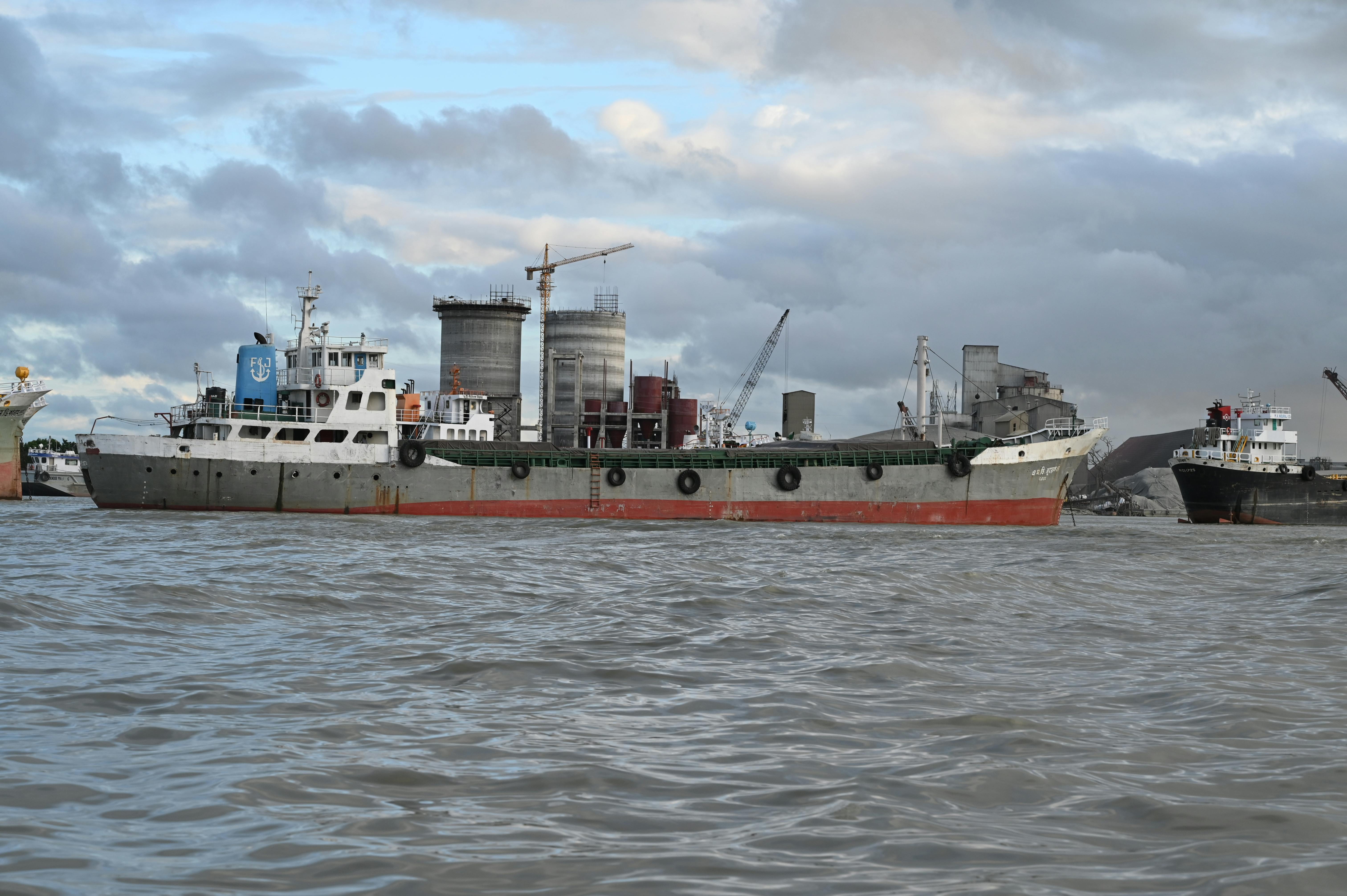 Blue and Red Ship on Sea · Free Stock Photo