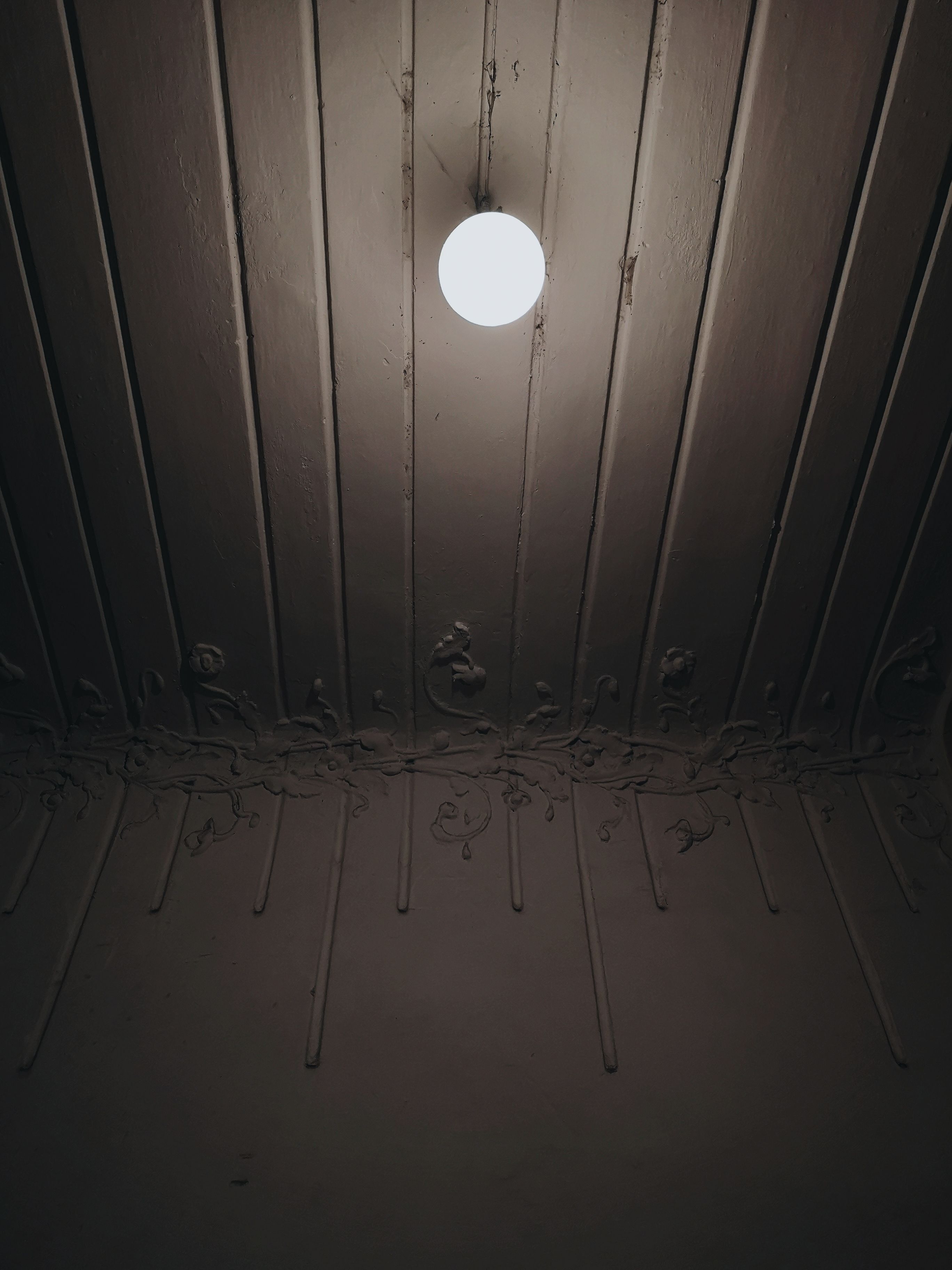 A Light Bulb in the Ceiling · Free Stock Photo