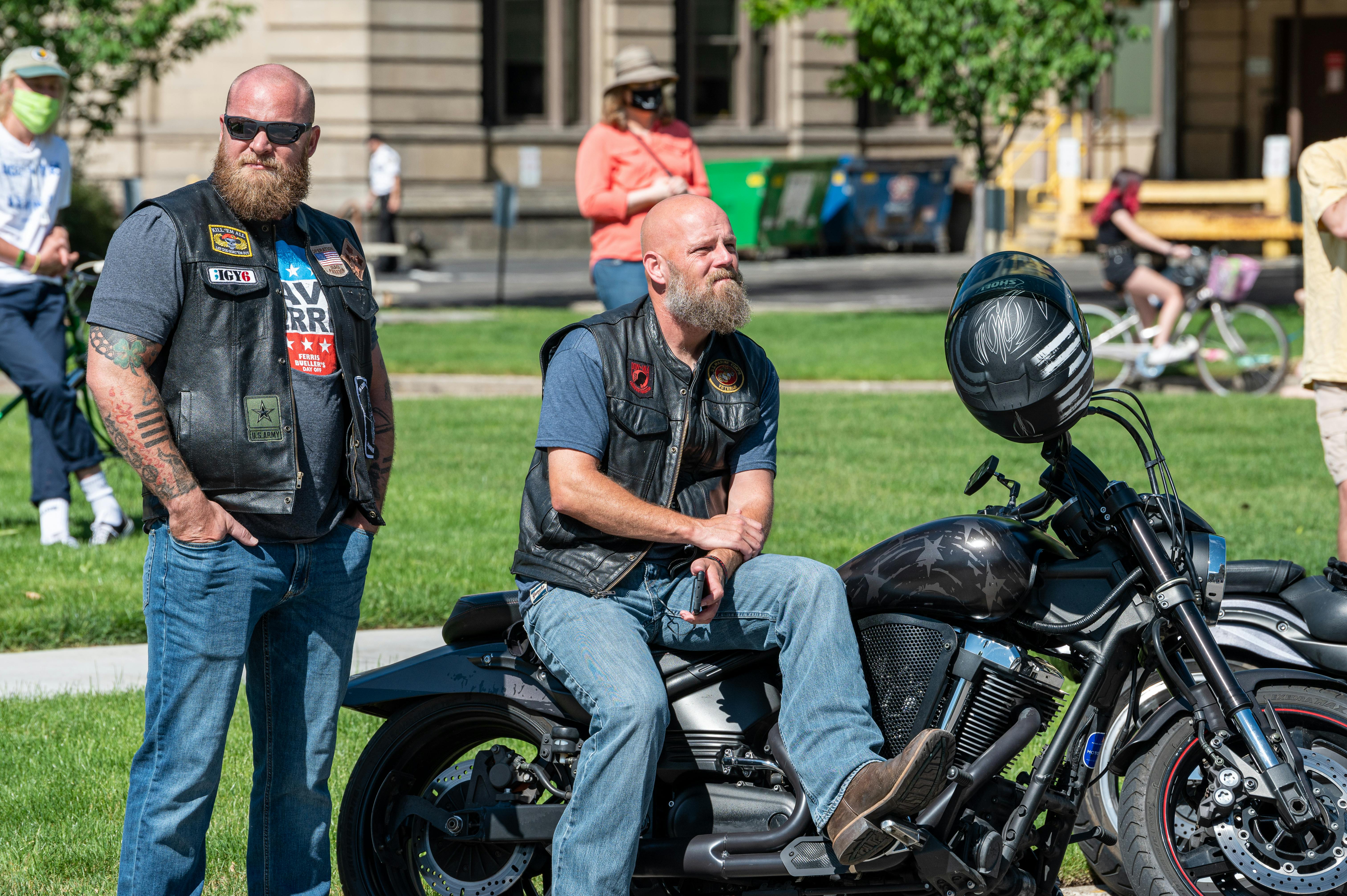 Bikers with motorcycle standing on street · Free Stock Photo