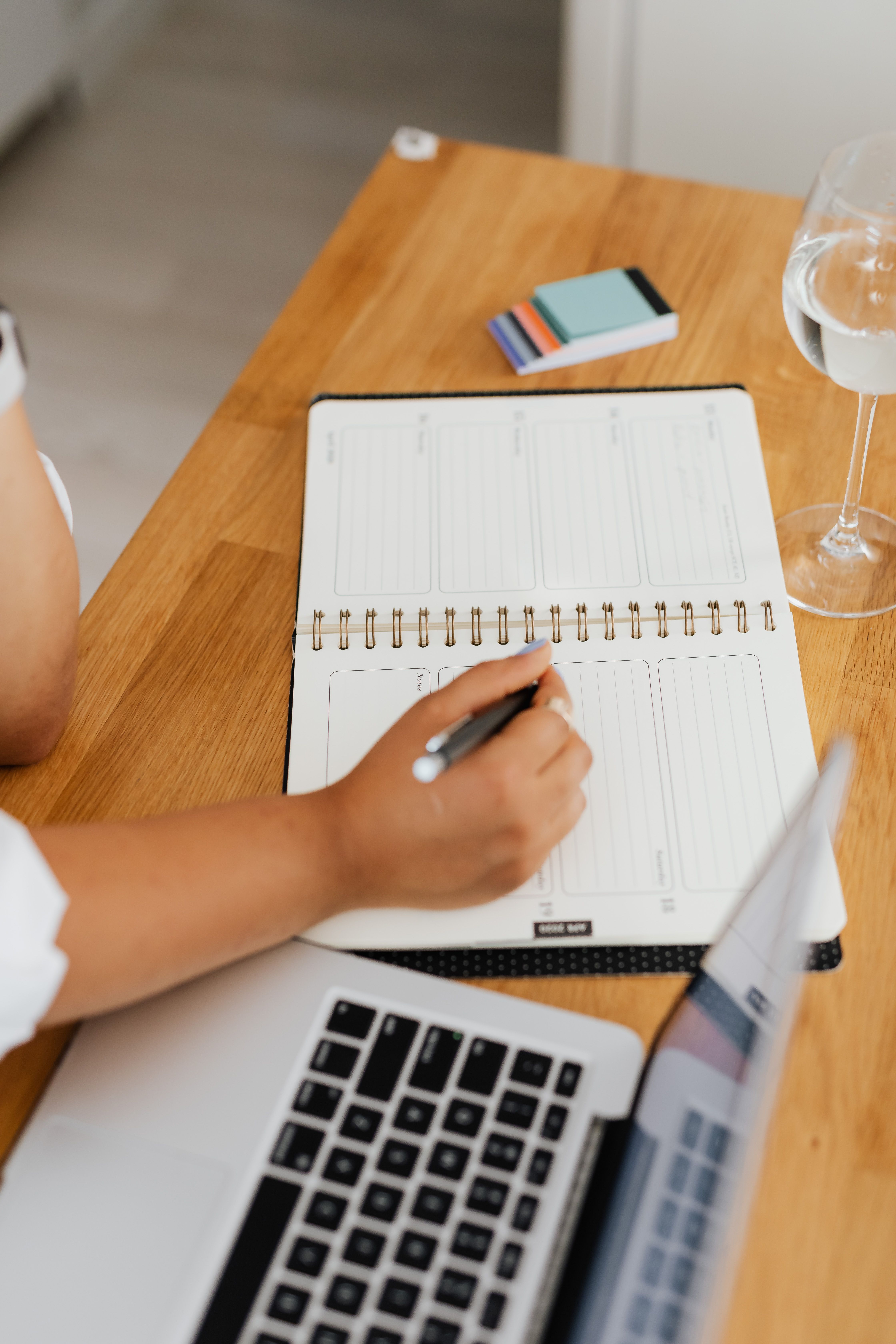 Woman Writing in Calendar · Free Stock Photo