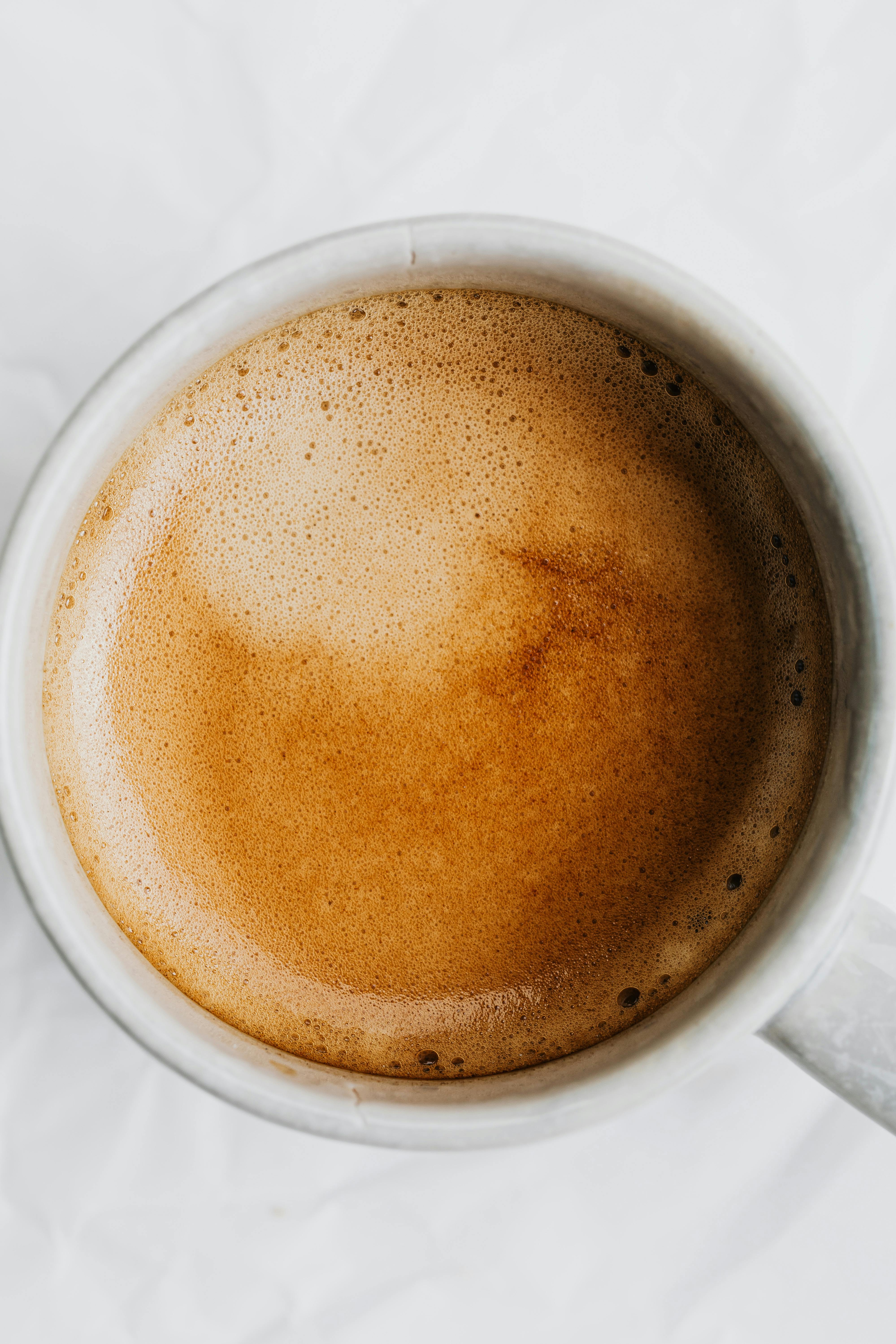 Top View of Coffee and Flowers · Free Stock Photo