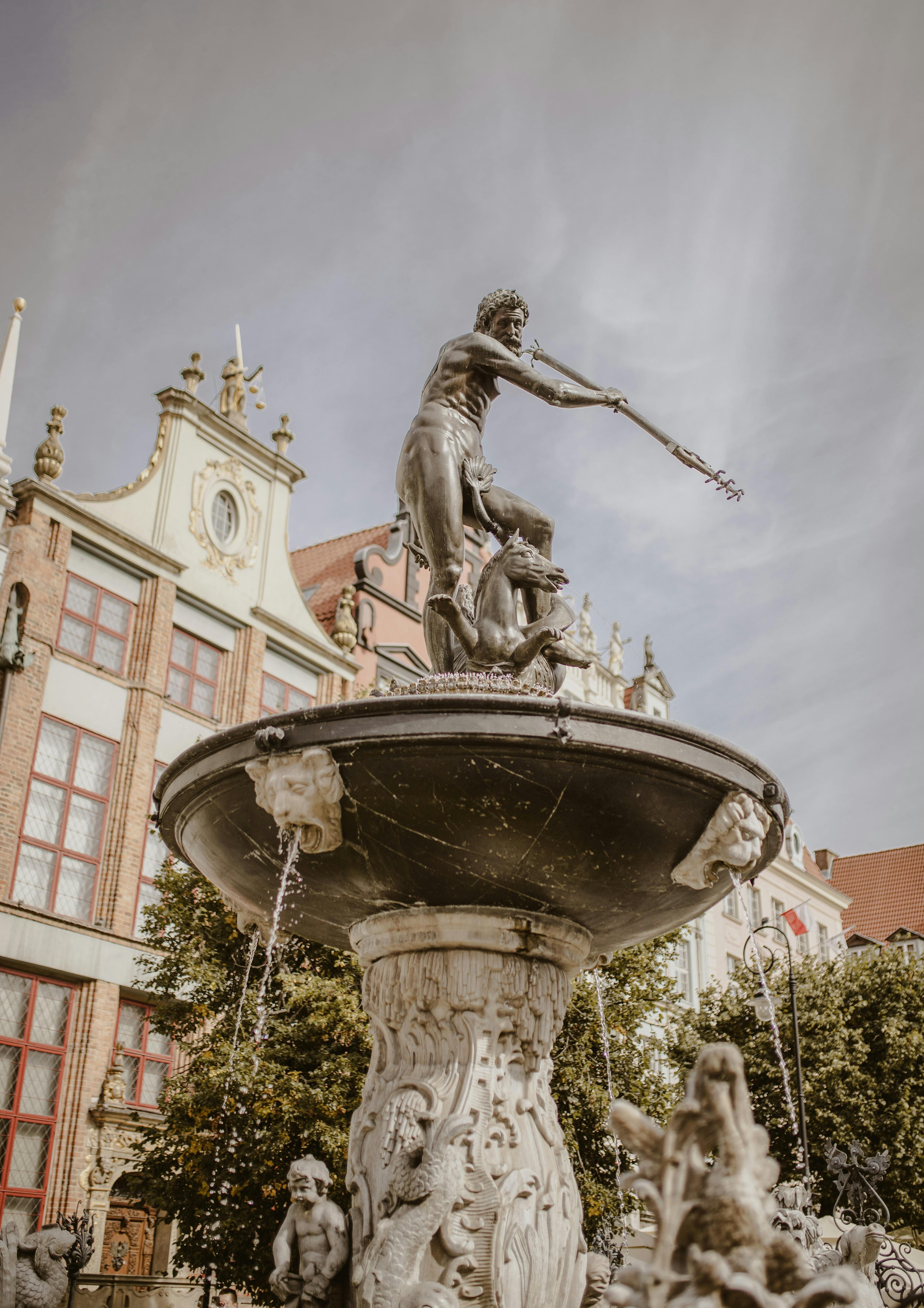 Aged buildings in shallow water of tropical shore · Free Stock Photo