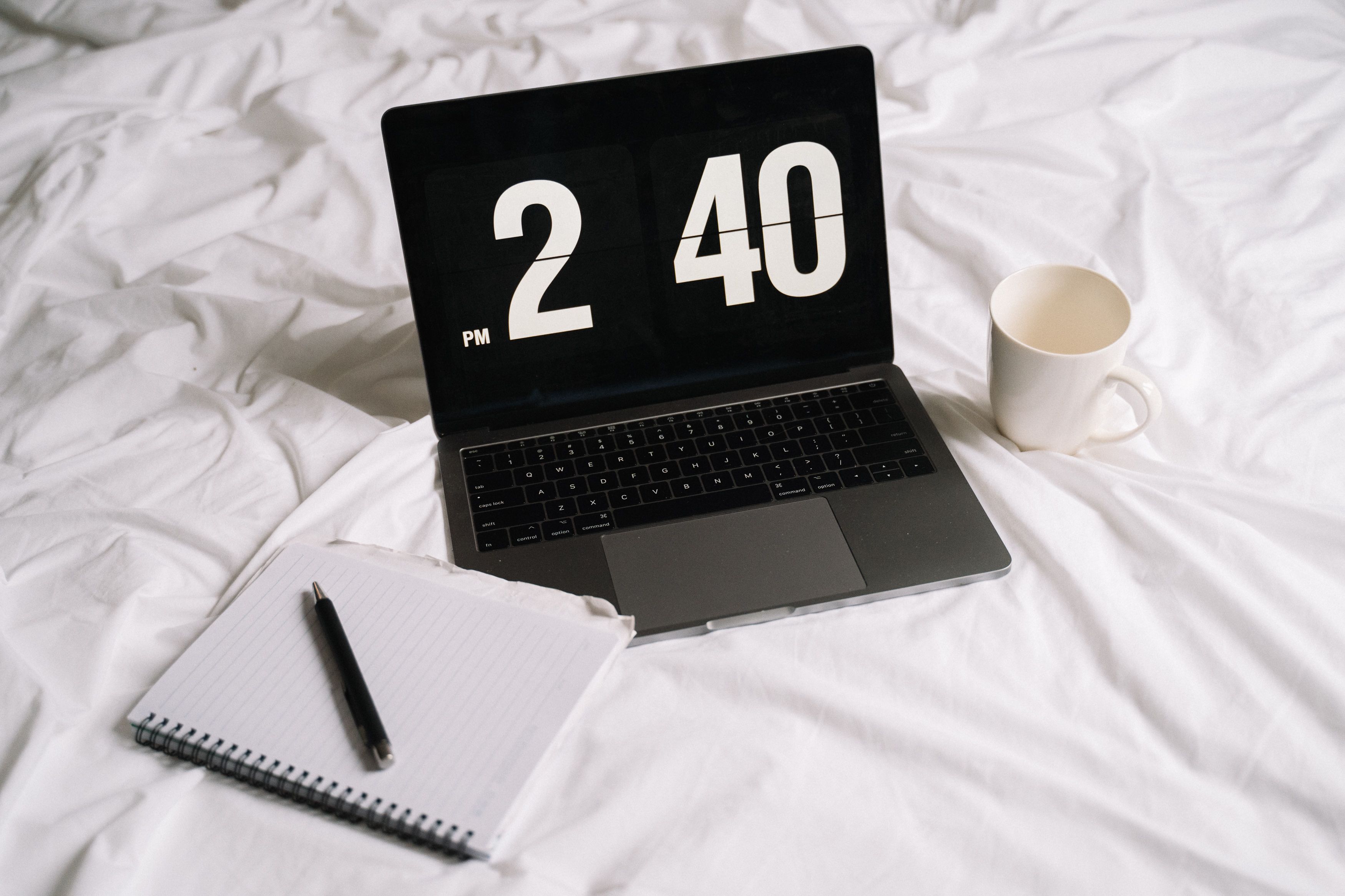 Black Laptop Computer on Bed · Free Stock Photo