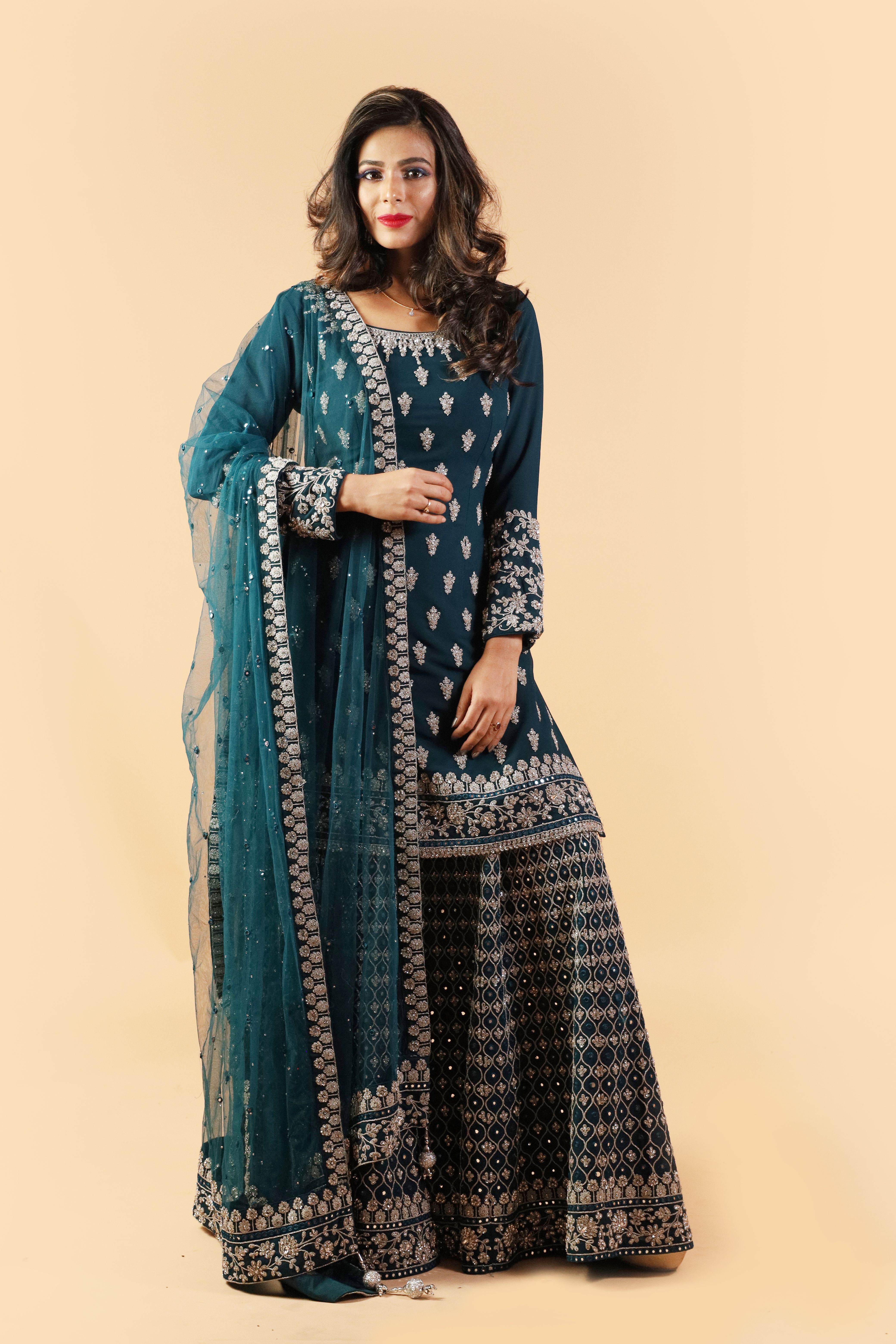 Studio Shot of Woman in Turquoise Sari · Free Stock Photo