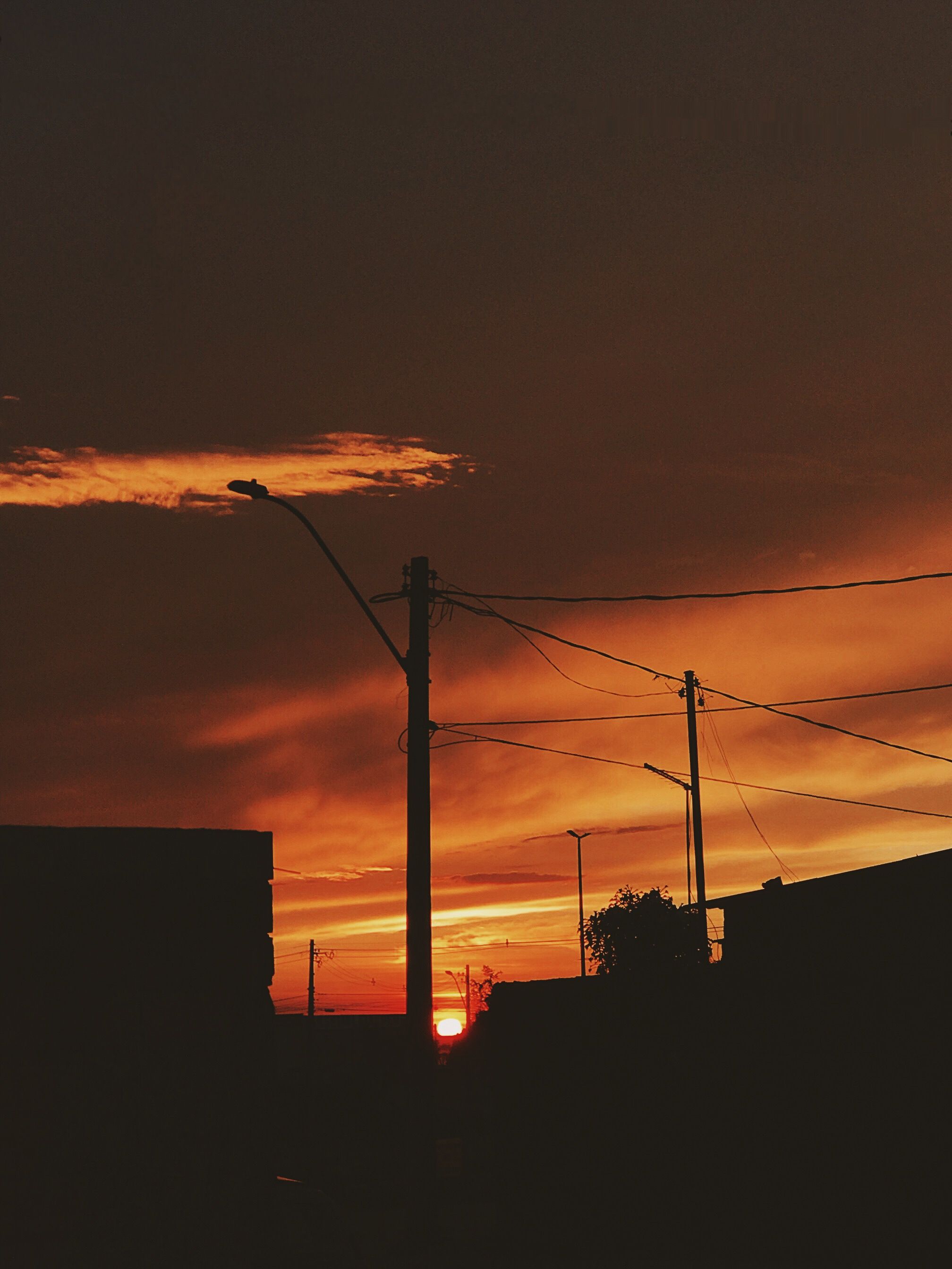 Silhouette Photography of Electric Post and Houses · Free Stock Photo