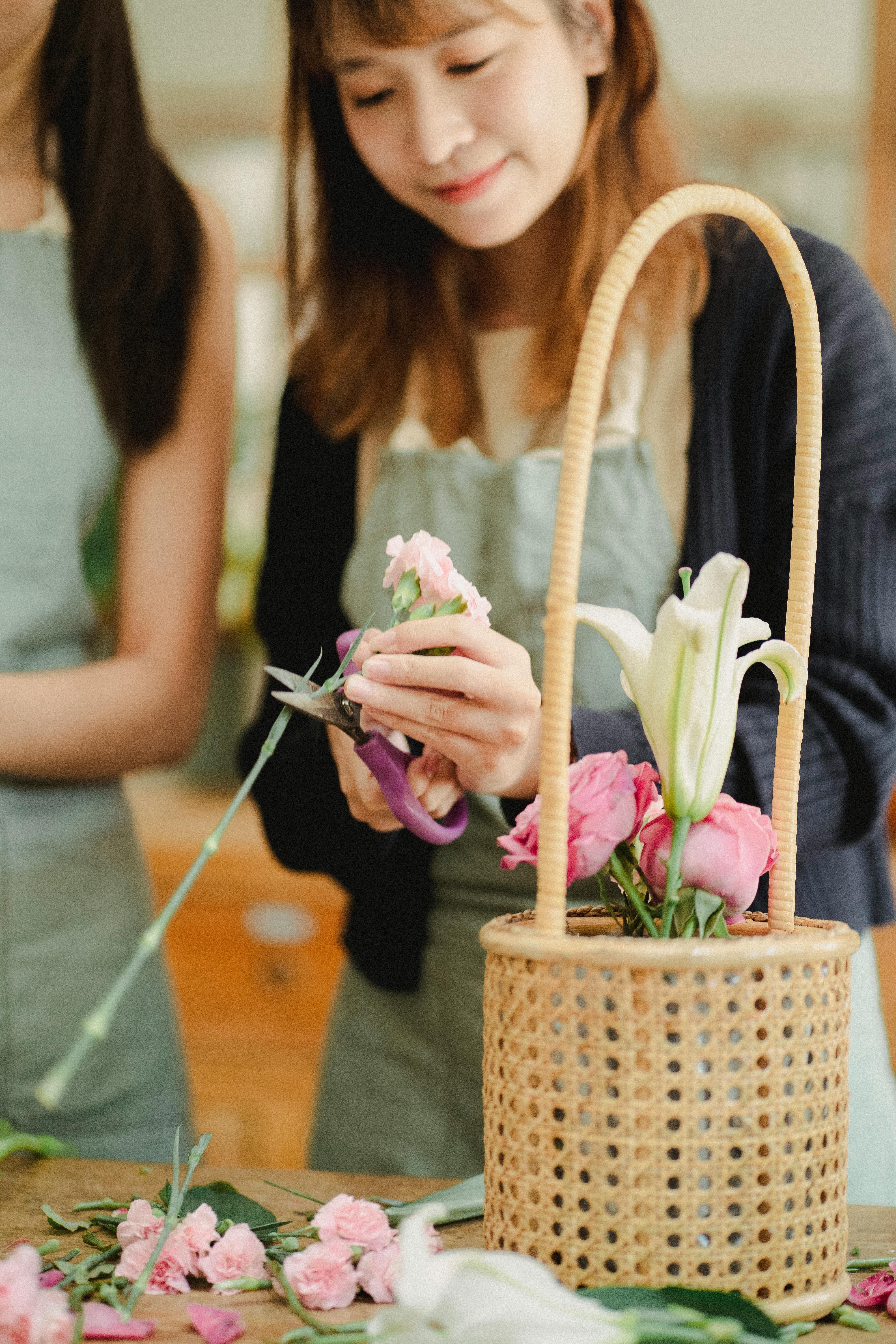 Cheerful black waitress standing at counter · Free Stock Photo