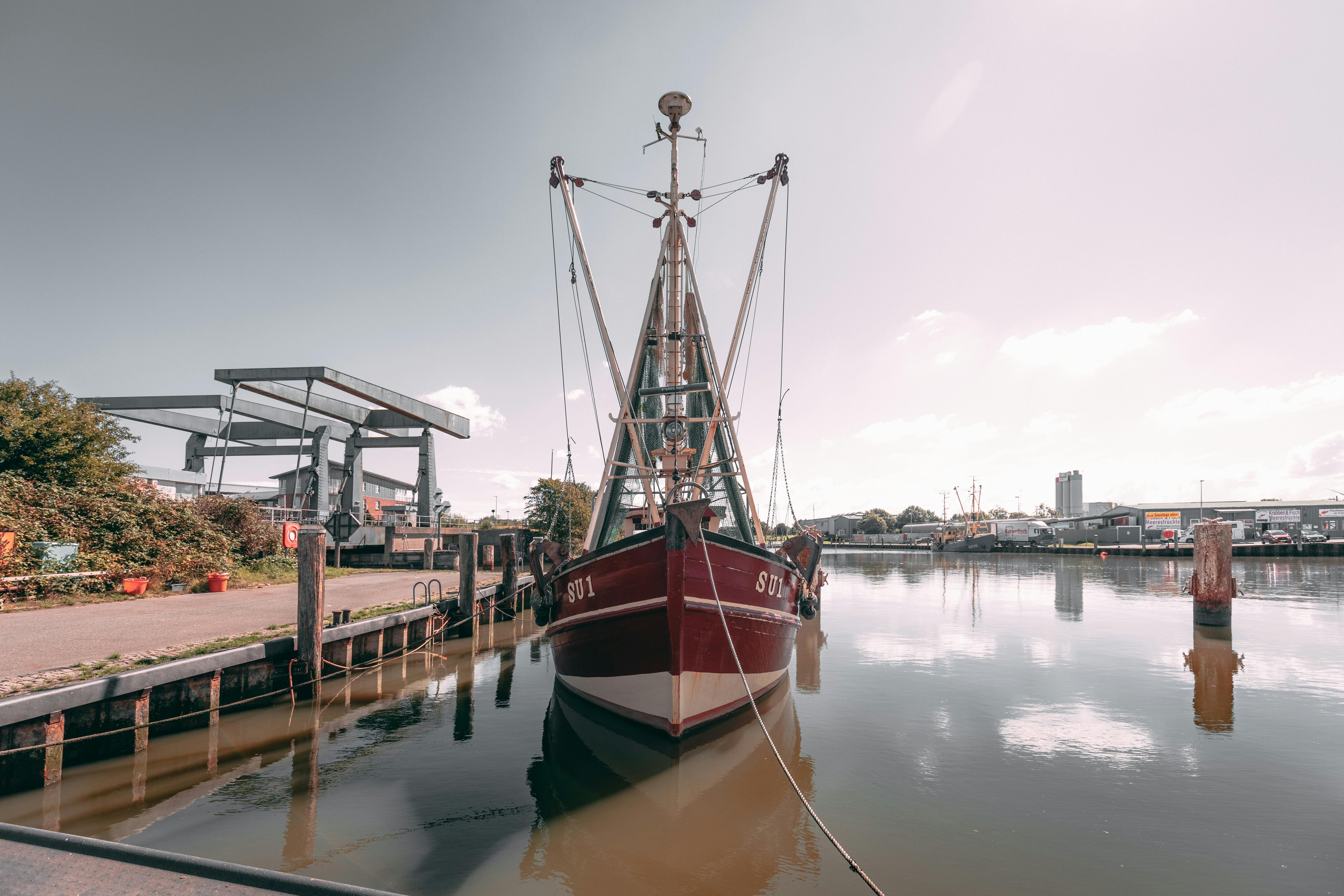 Red Boat on Docking Area · Free Stock Photo