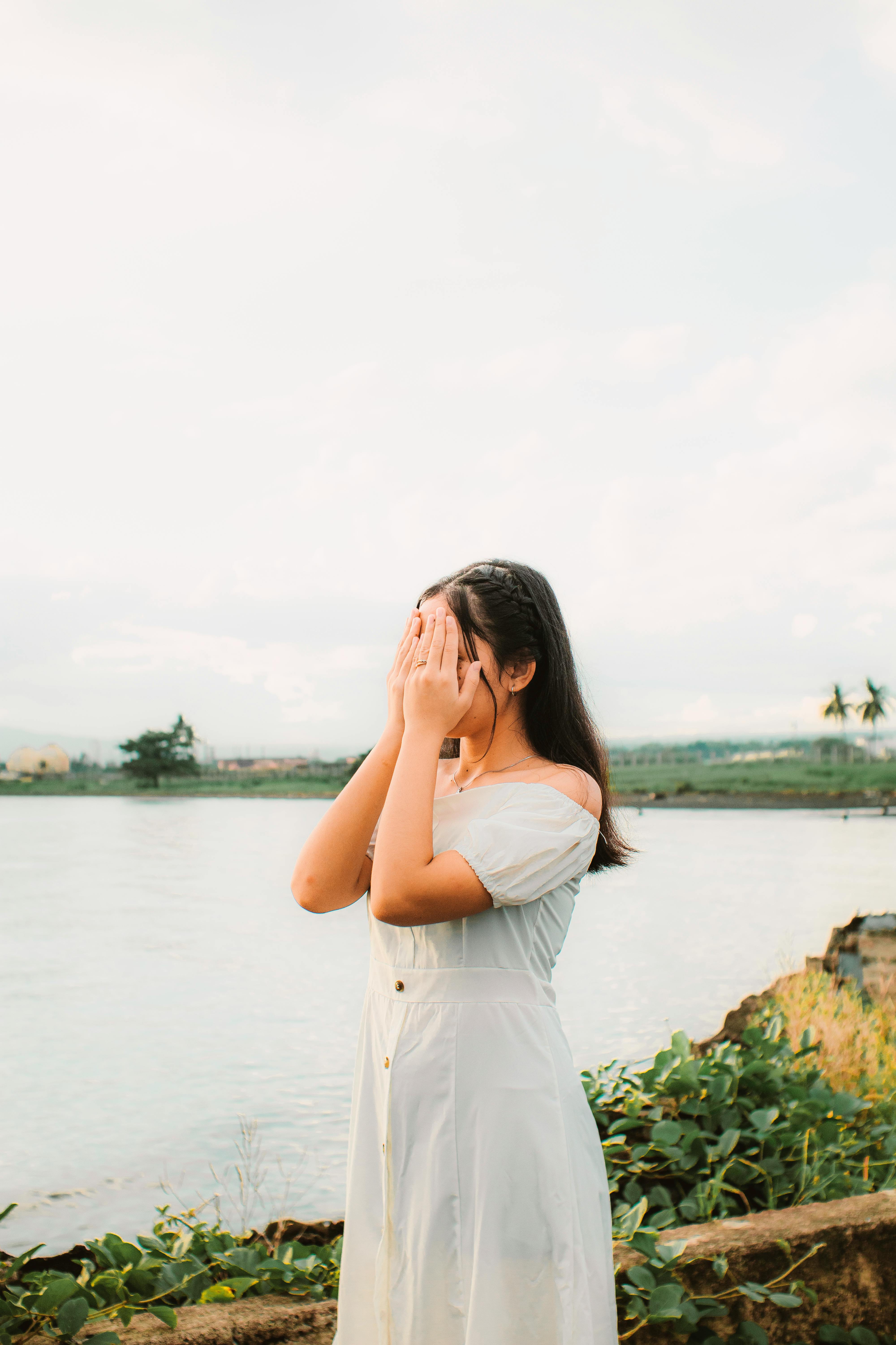 Faceless woman in trendy clothes with fluffy plants · Free Stock Photo