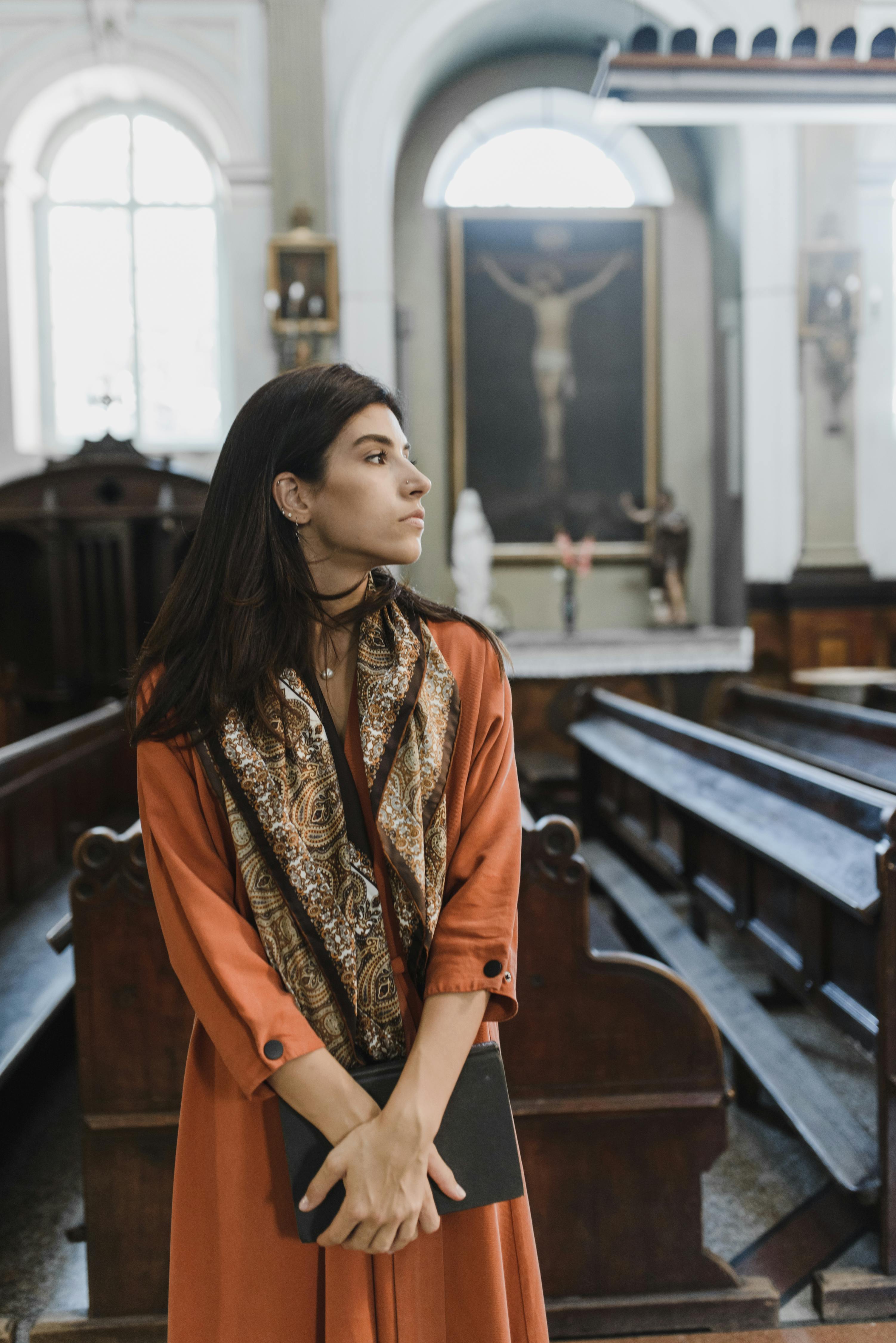 Portrait of Brunette Woman at Church · Free Stock Photo