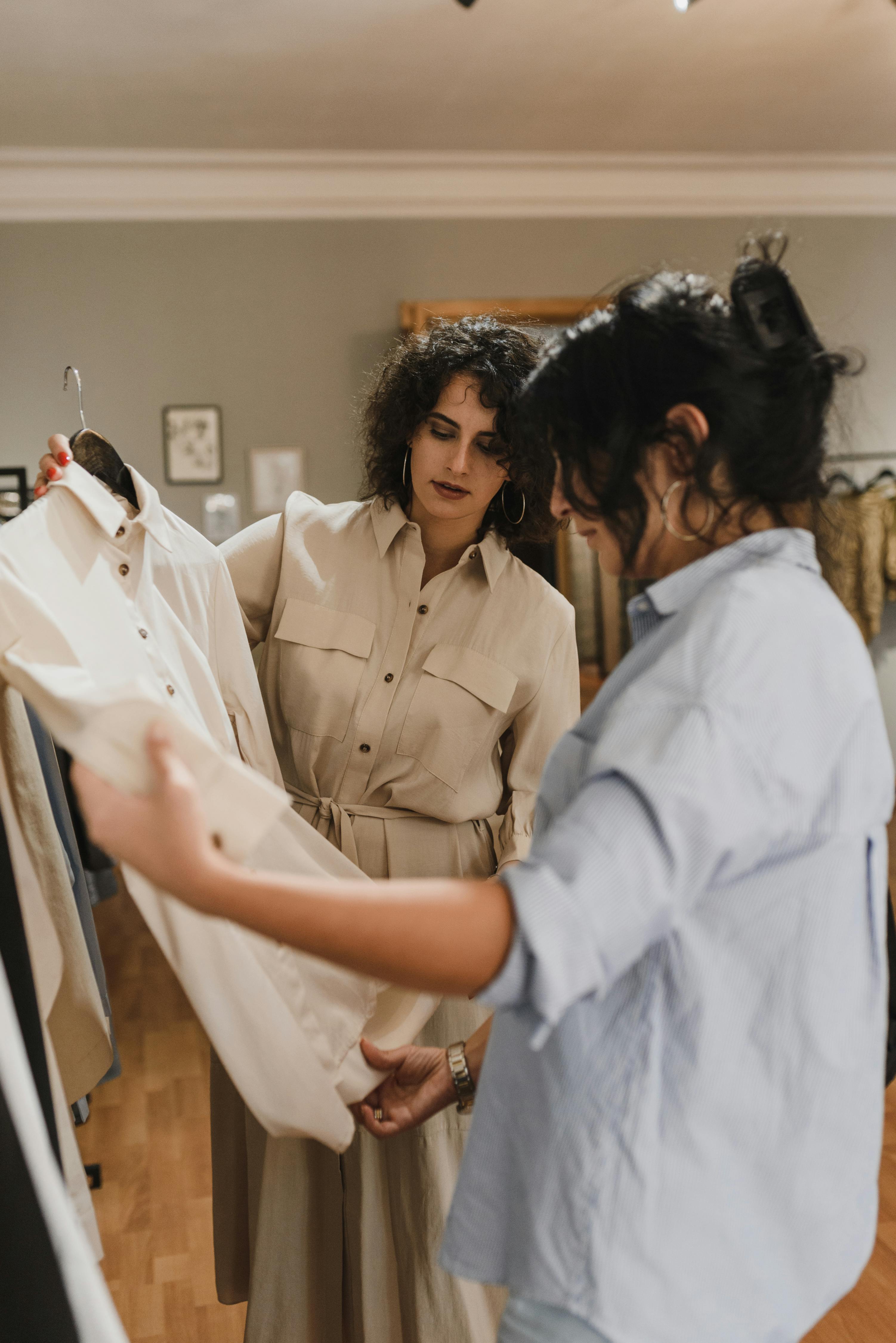 Women Watching Clothes in Clothes Store · Free Stock Photo