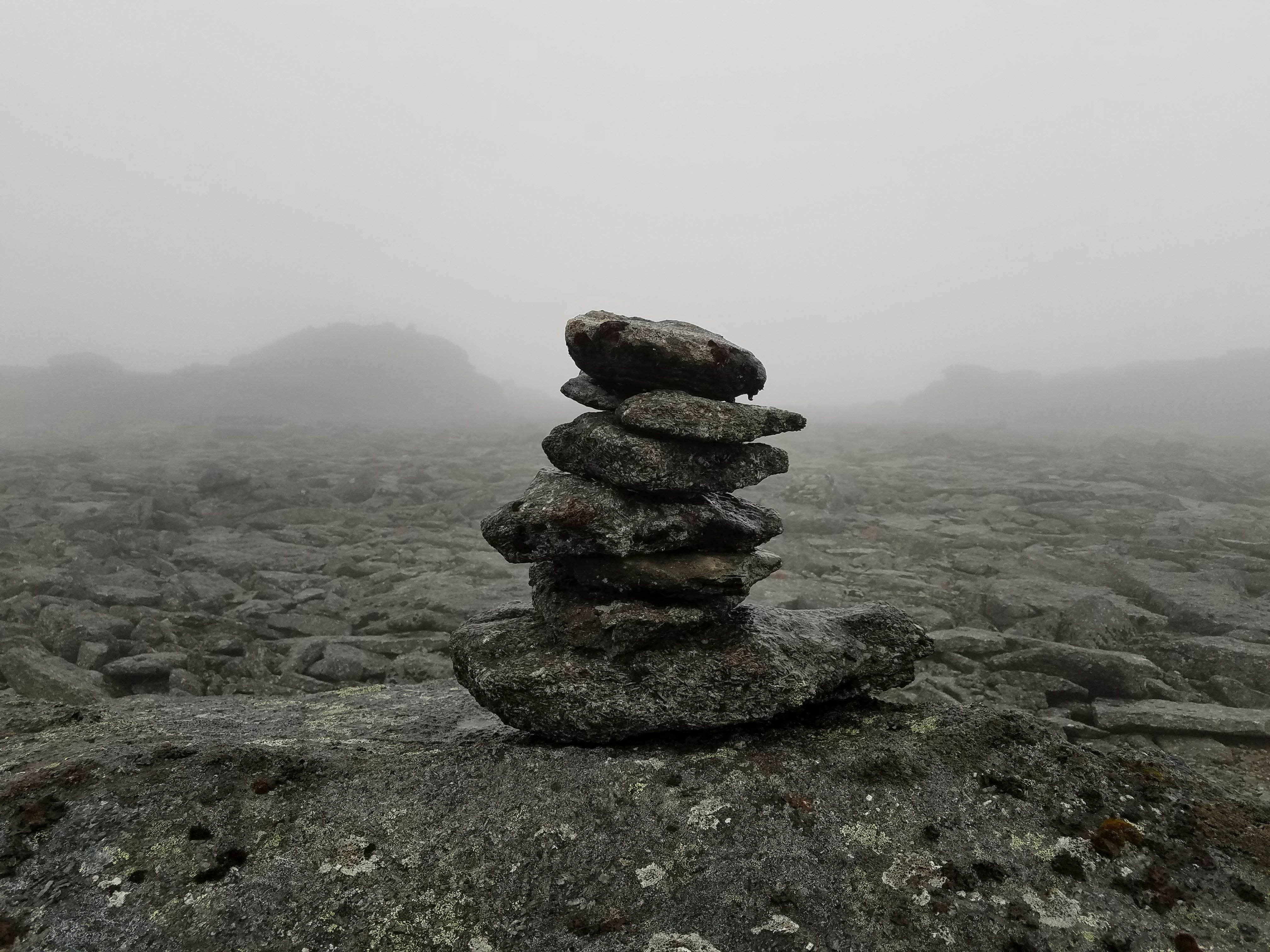 Pile of Stacked Stones in Wasteland · Free Stock Photo