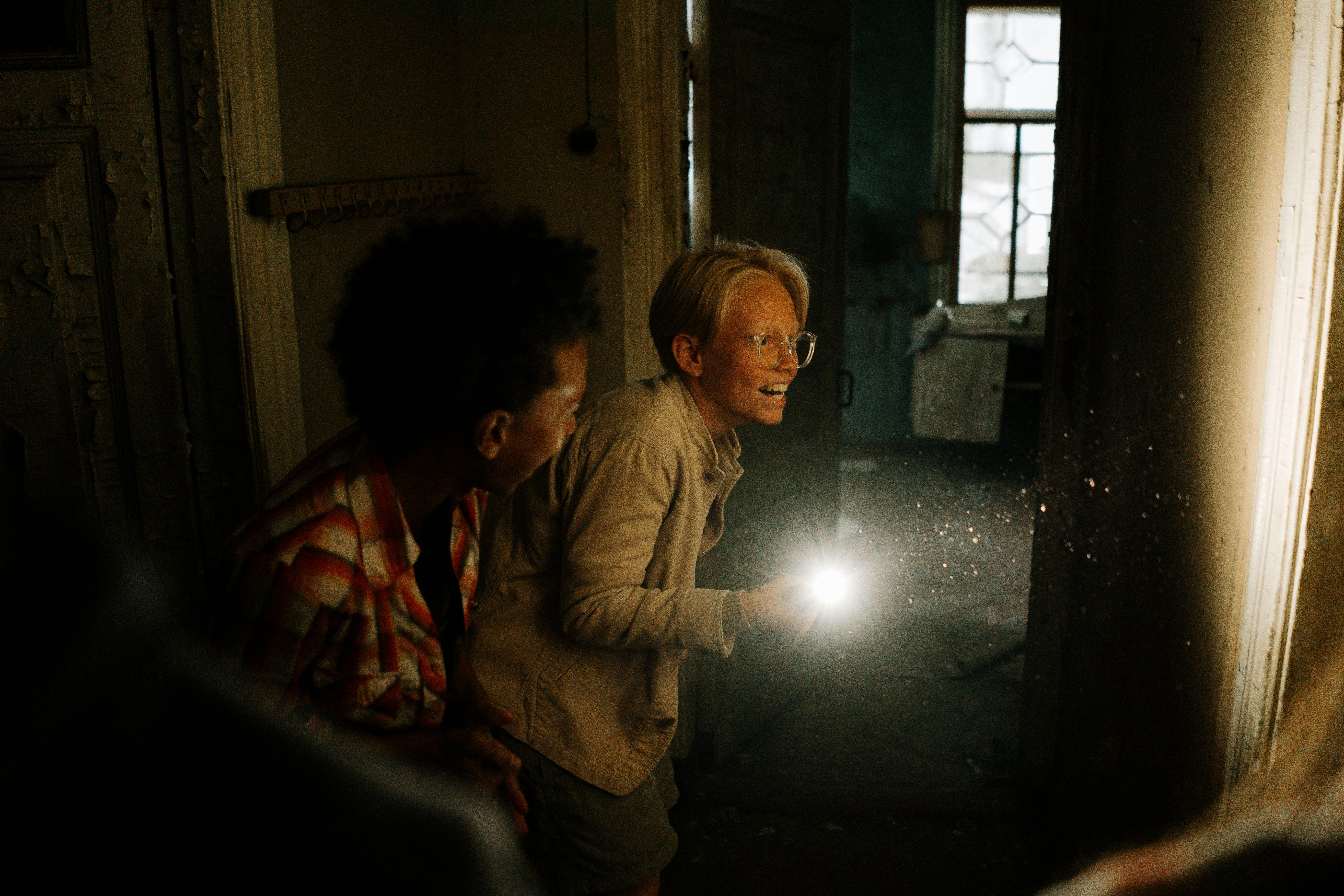 Two Boys using Flashlight · Free Stock Photo