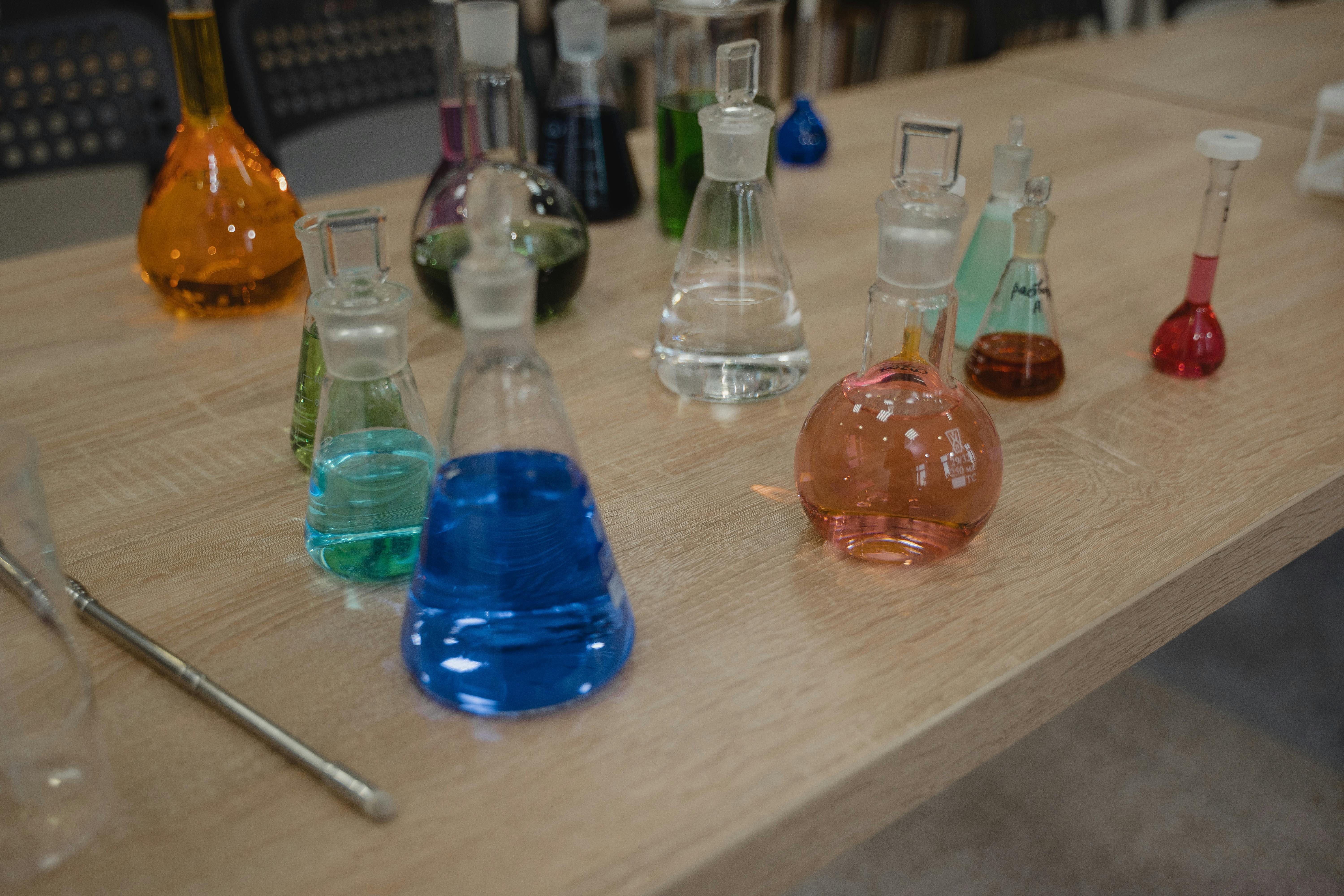 Colored Liquids on Laboratory Glassware · Free Stock Photo