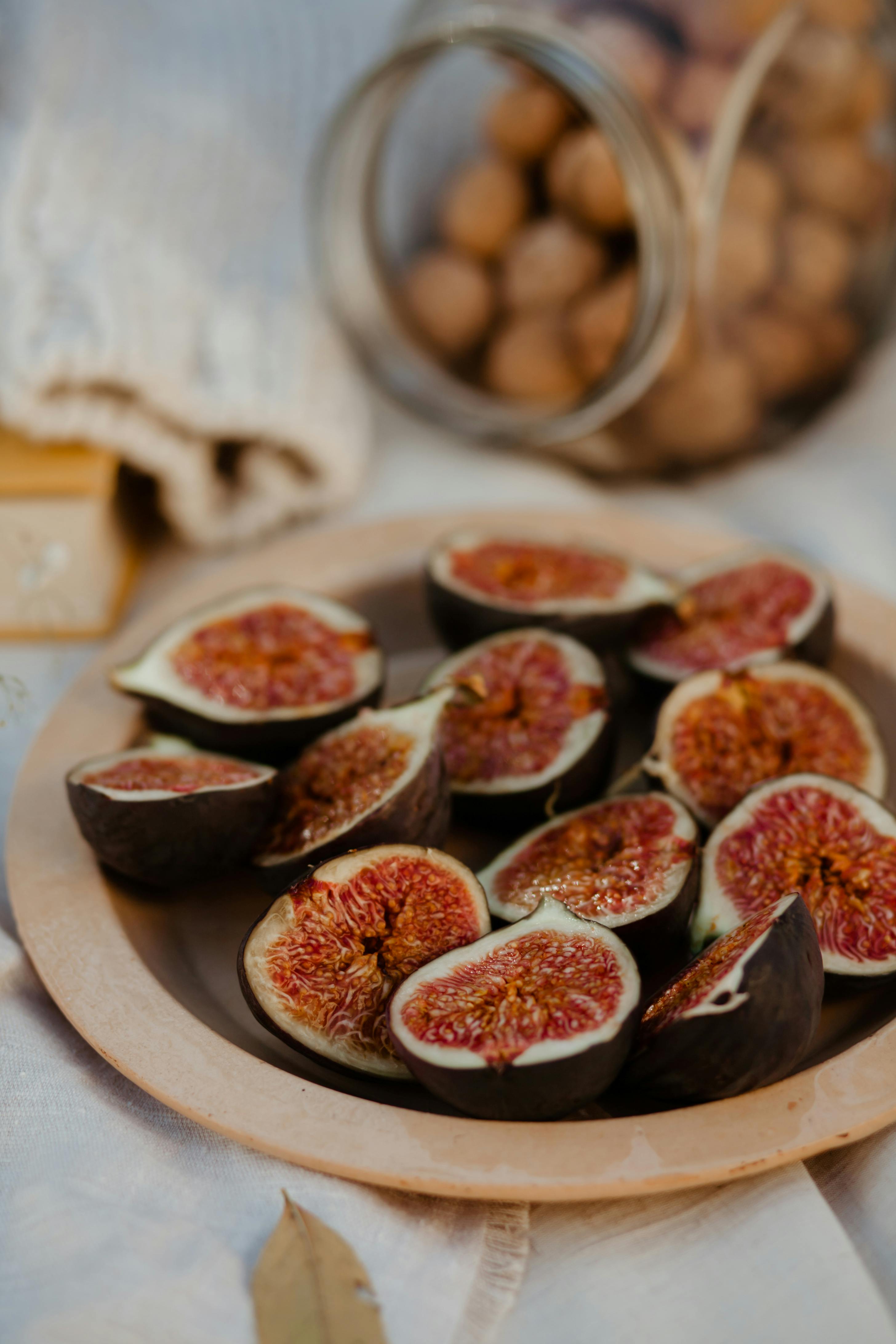 Close-up Photo of Sliced Figs on a Plate · Free Stock Photo