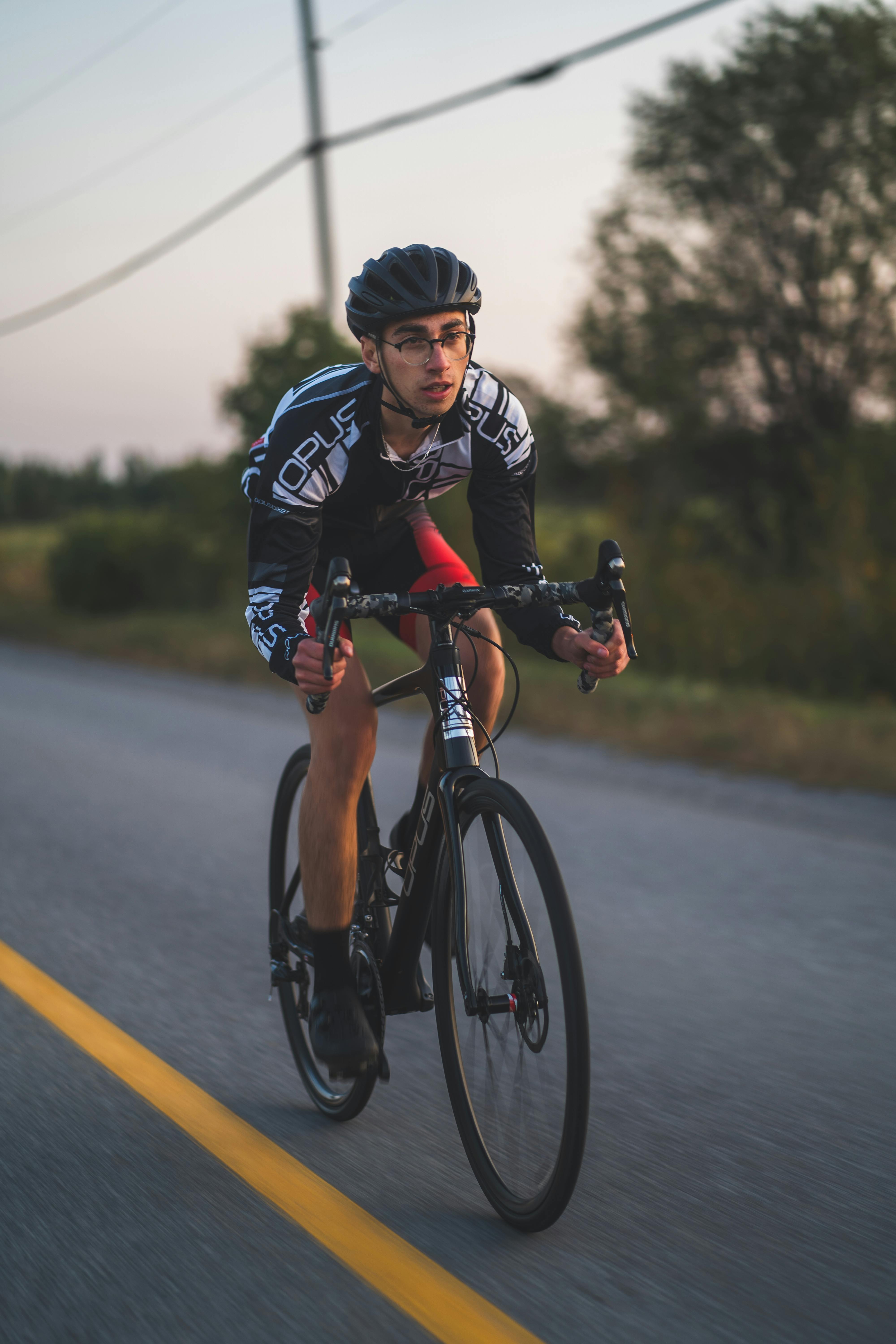 Biker riding a Bike · Free Stock Photo