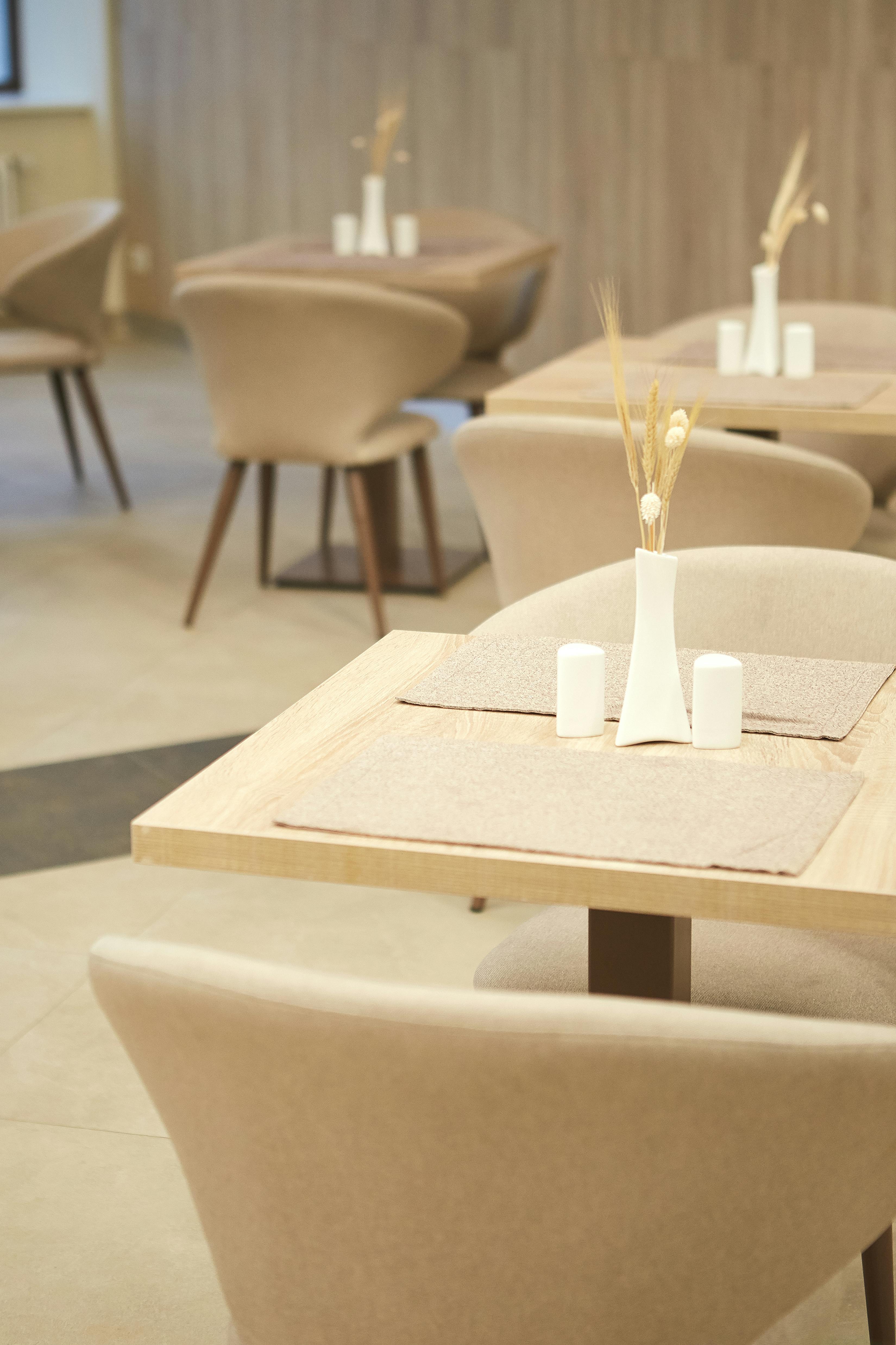 Photo of Wooden Chair Next to Wooden Table · Free Stock Photo