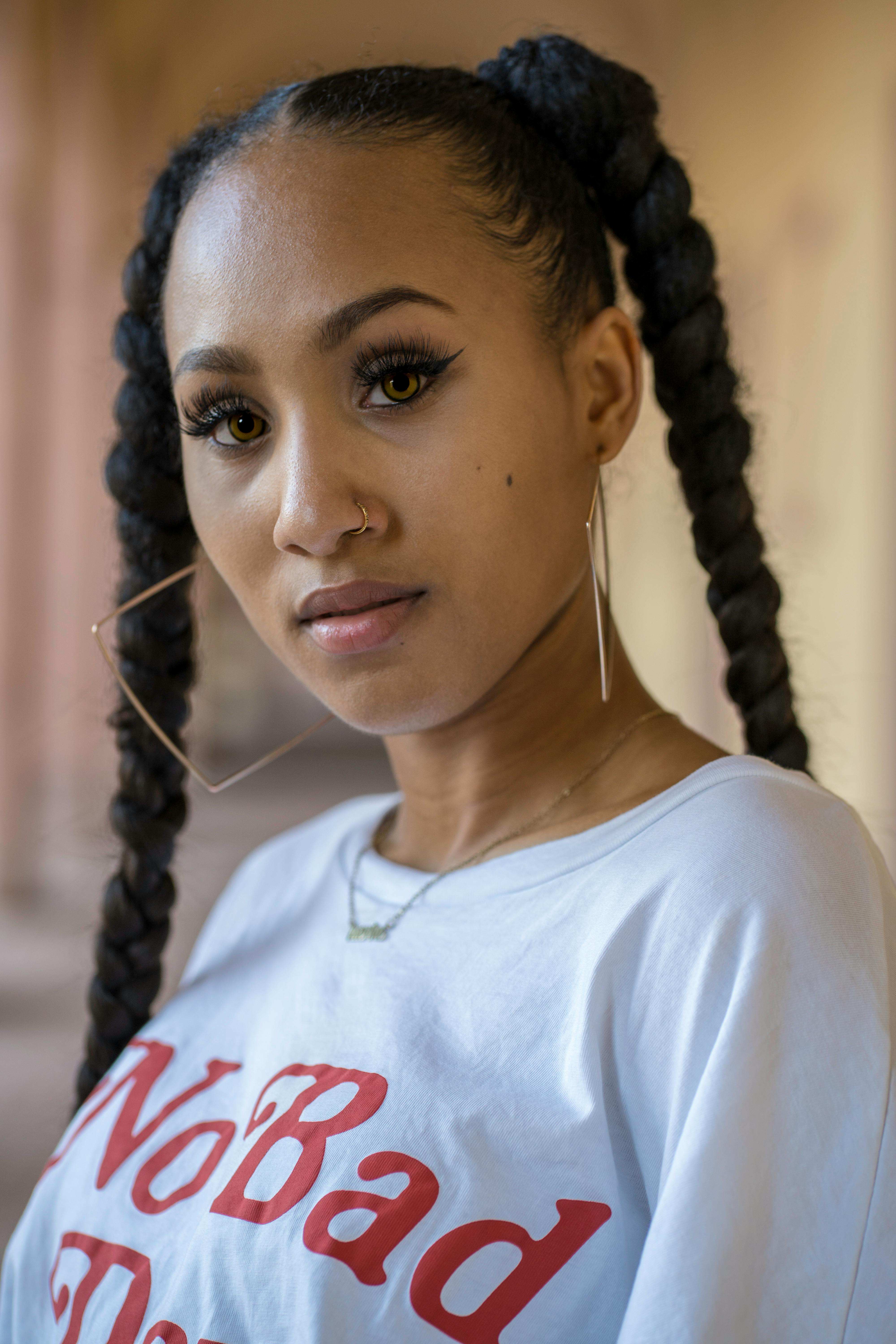 A Braided Hair Woman with Nose Piercing · Free Stock Photo