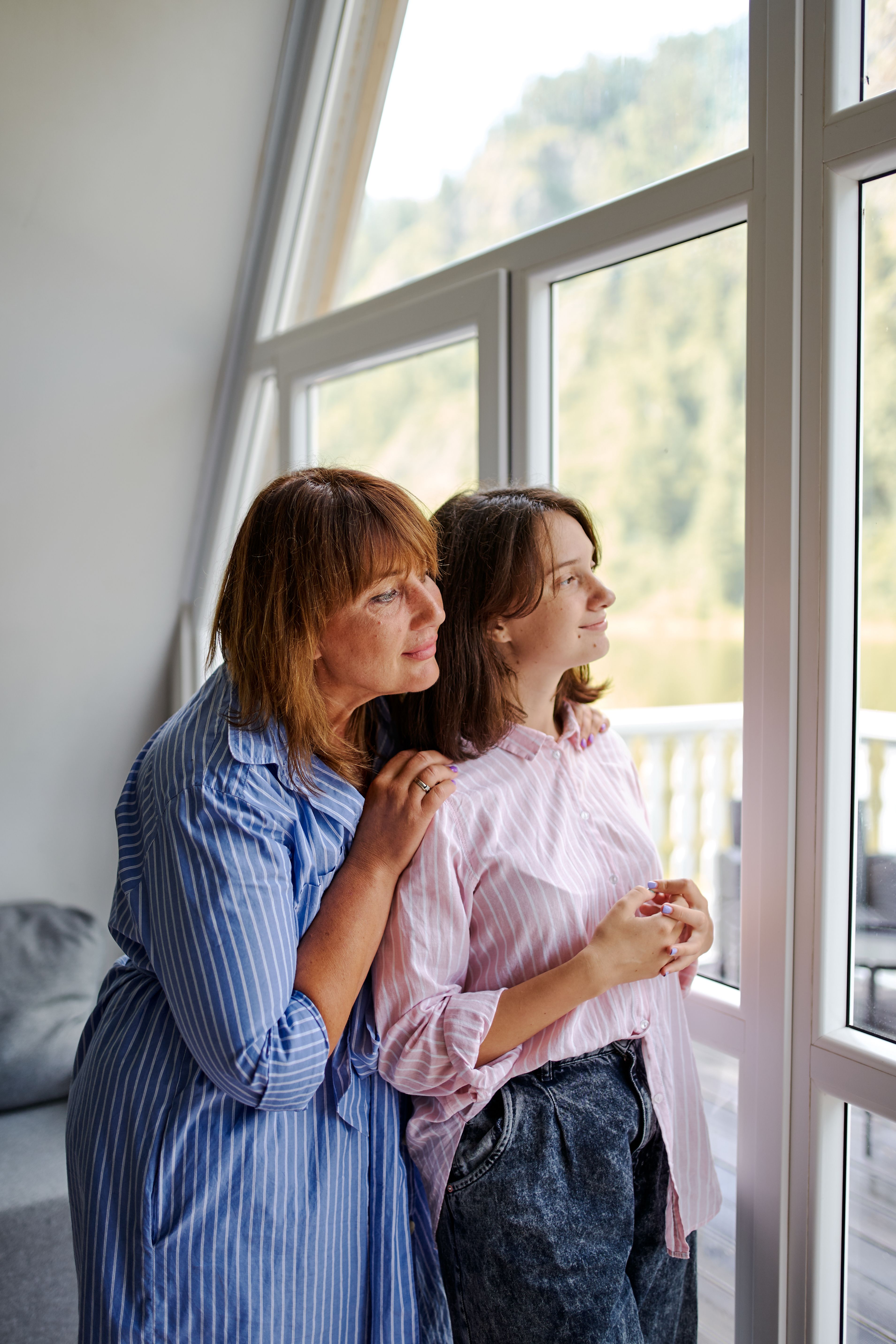 Women looking out window and dreaming · Free Stock Photo