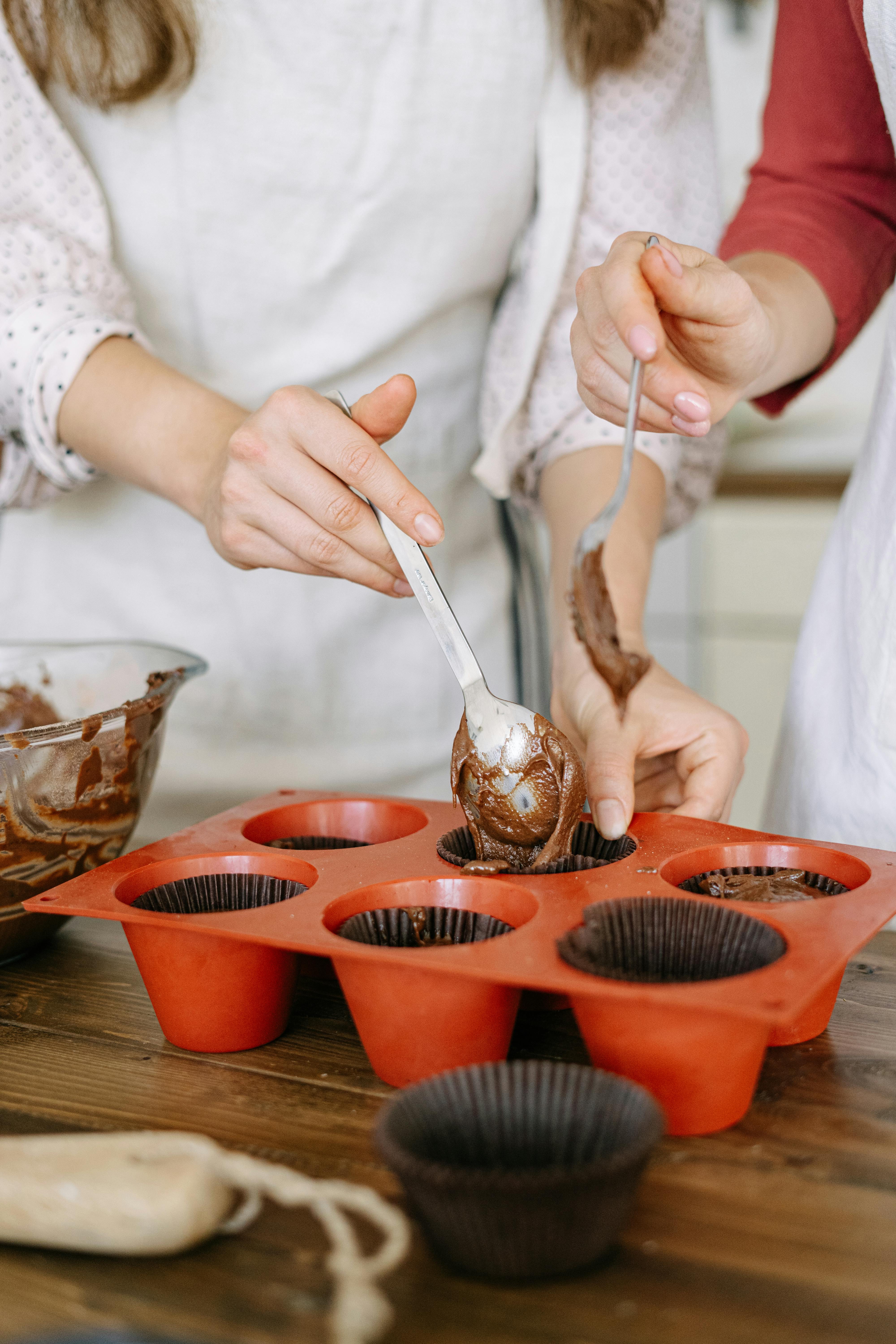 Person Holding Stainless Steel Spoon · Free Stock Photo
