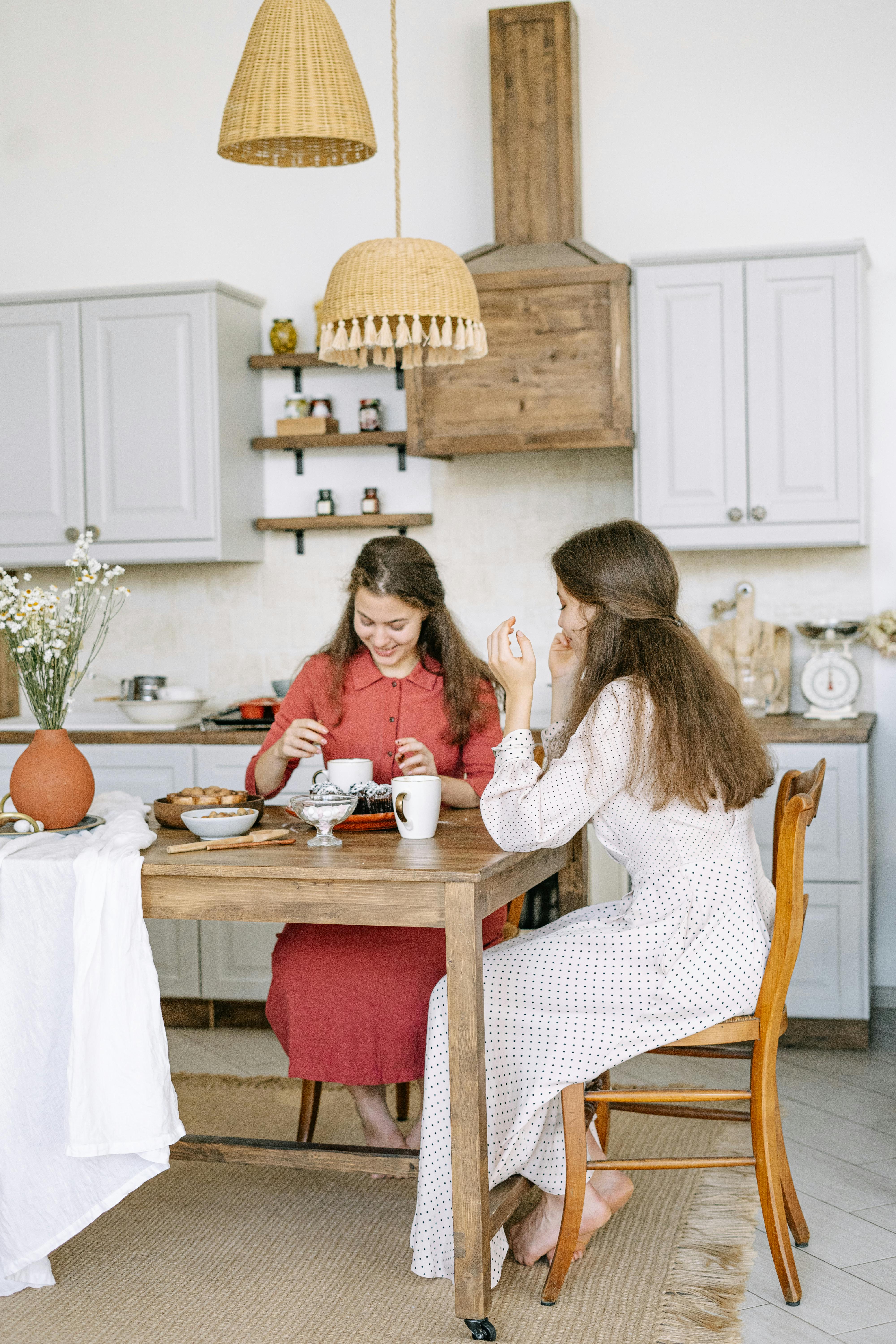 Women Sitting at the Table · Free Stock Photo
