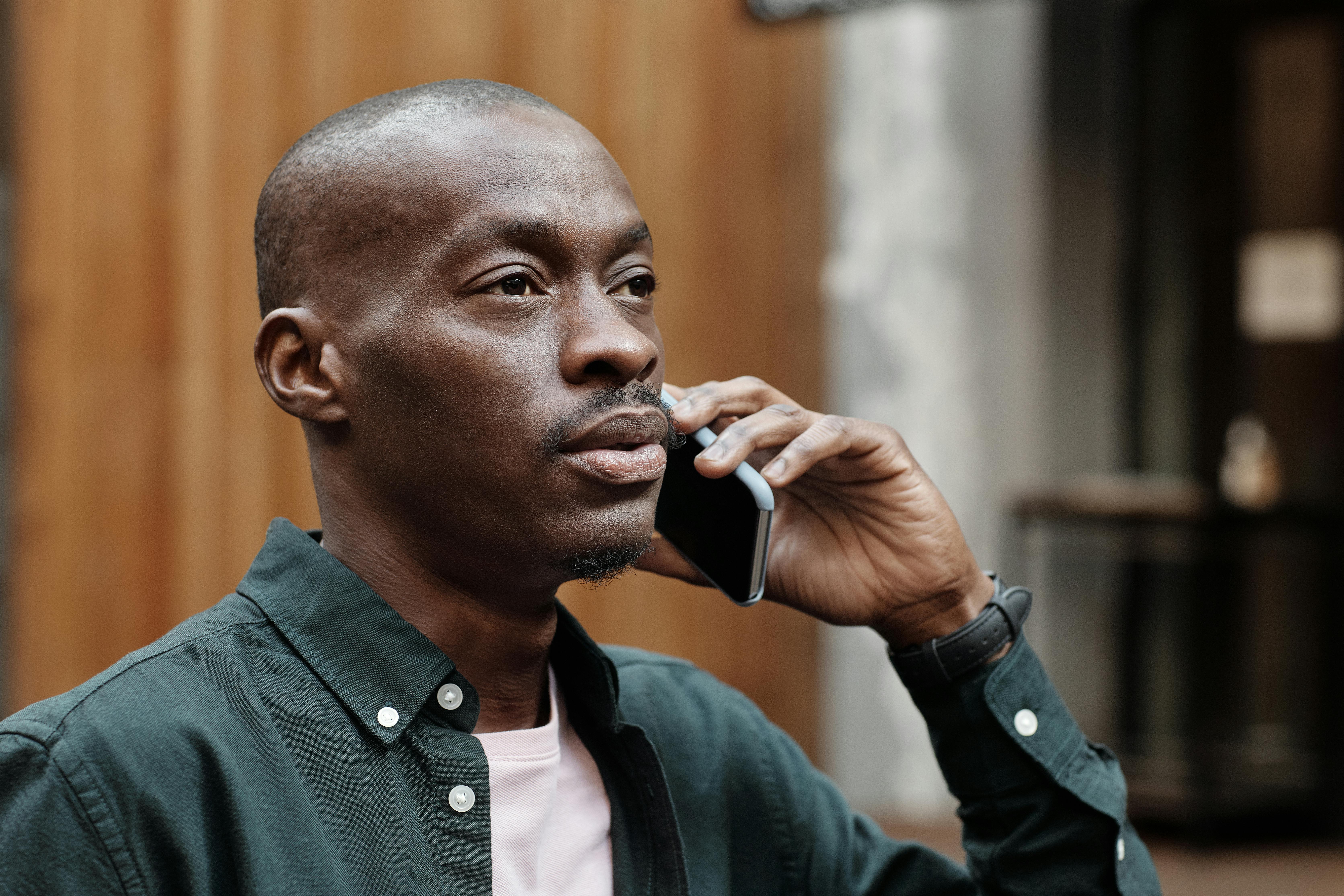 A Man Talking on the Phone · Free Stock Photo