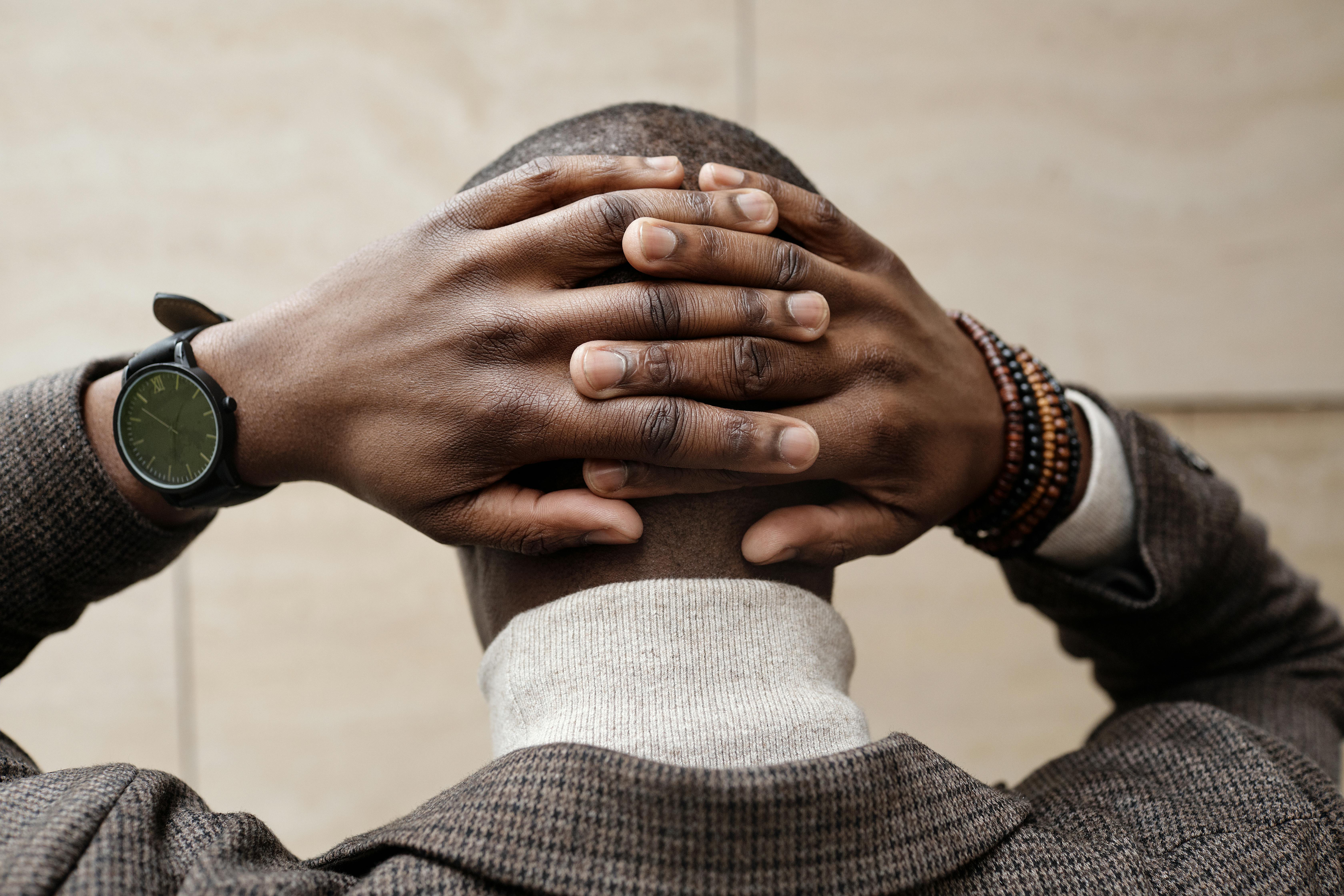 Backview of Stylish Man holding his Head · Free Stock Photo