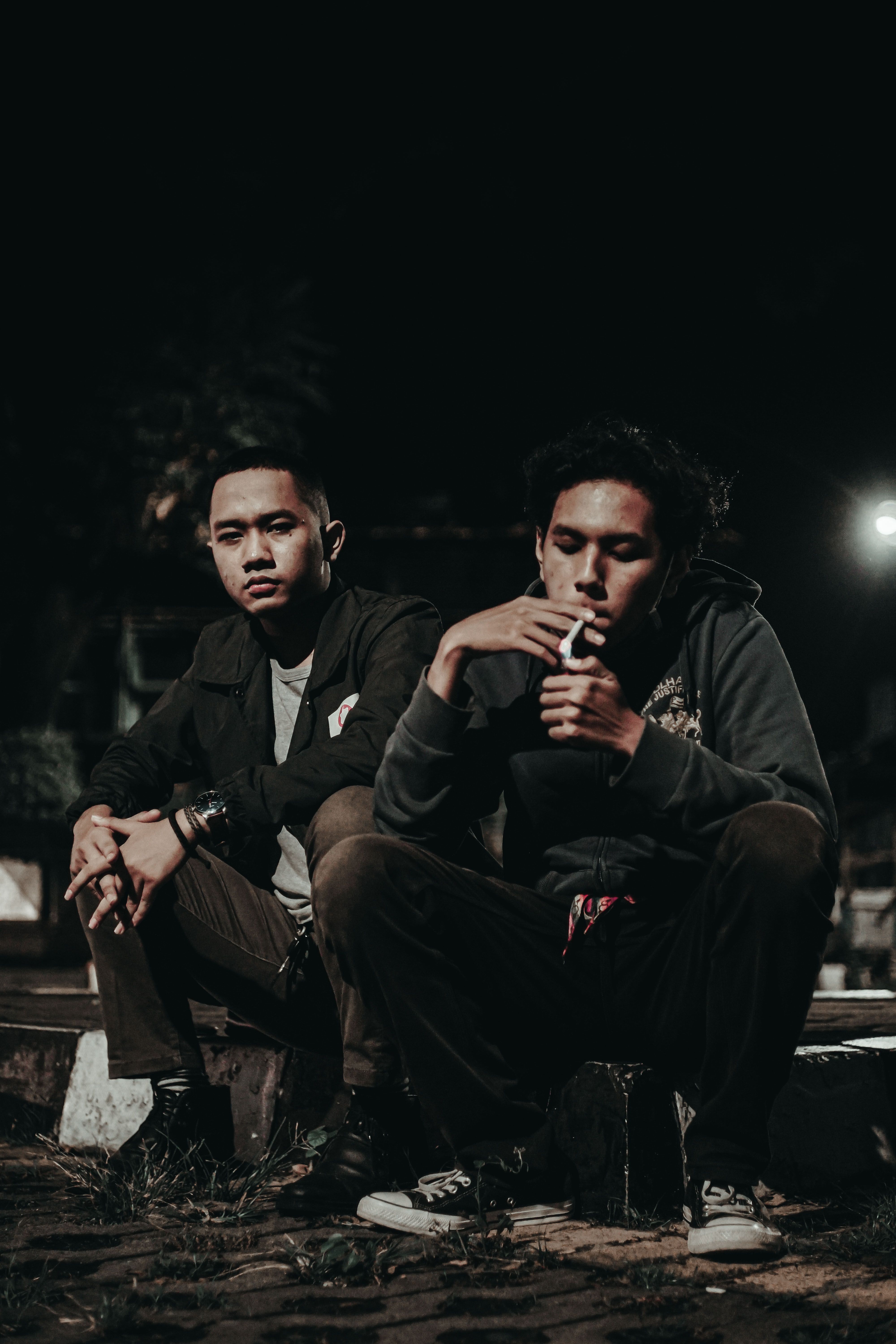 Two Men Smoking Together · Free Stock Photo
