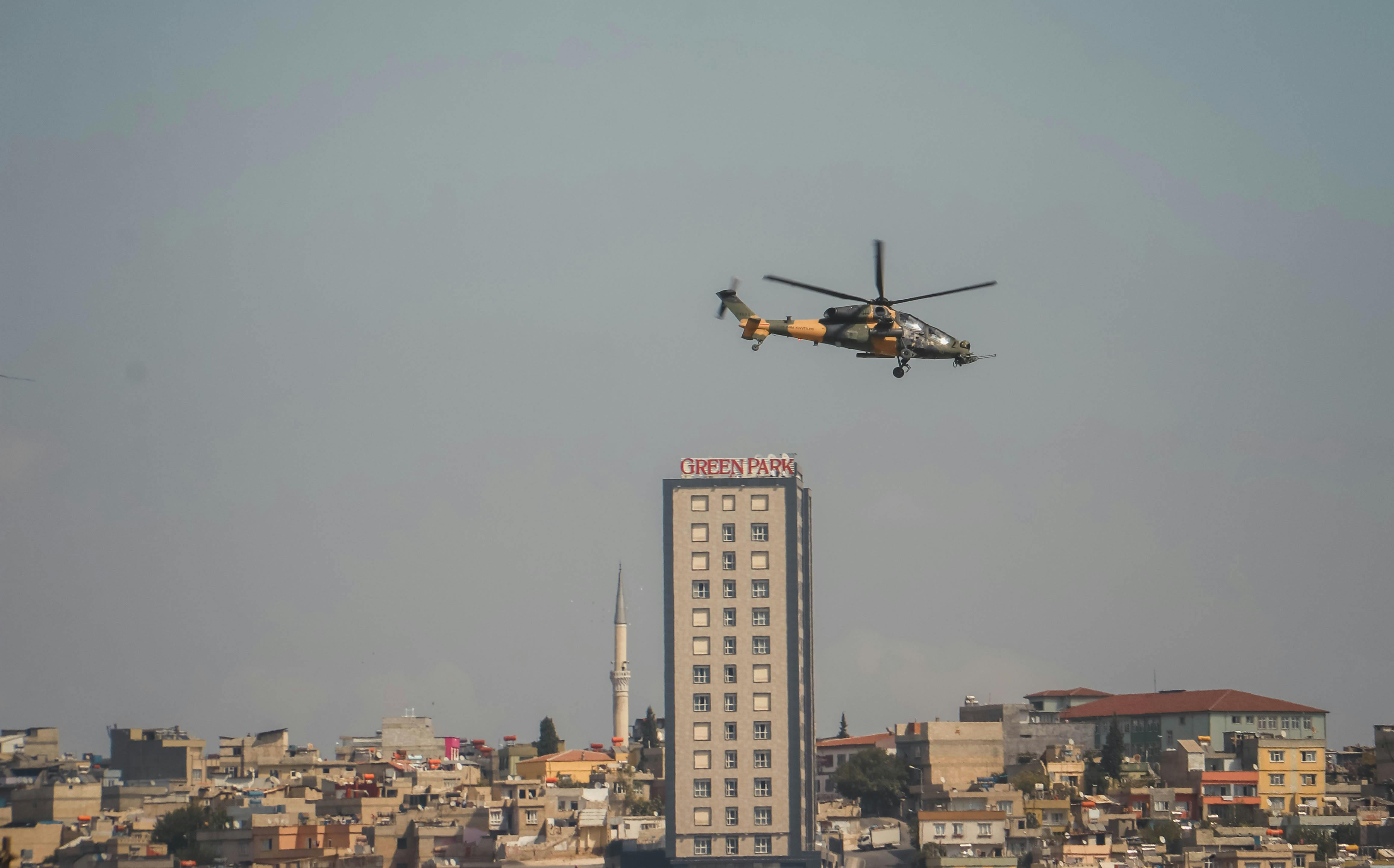Helicopter Flying Over City · Free Stock Photo