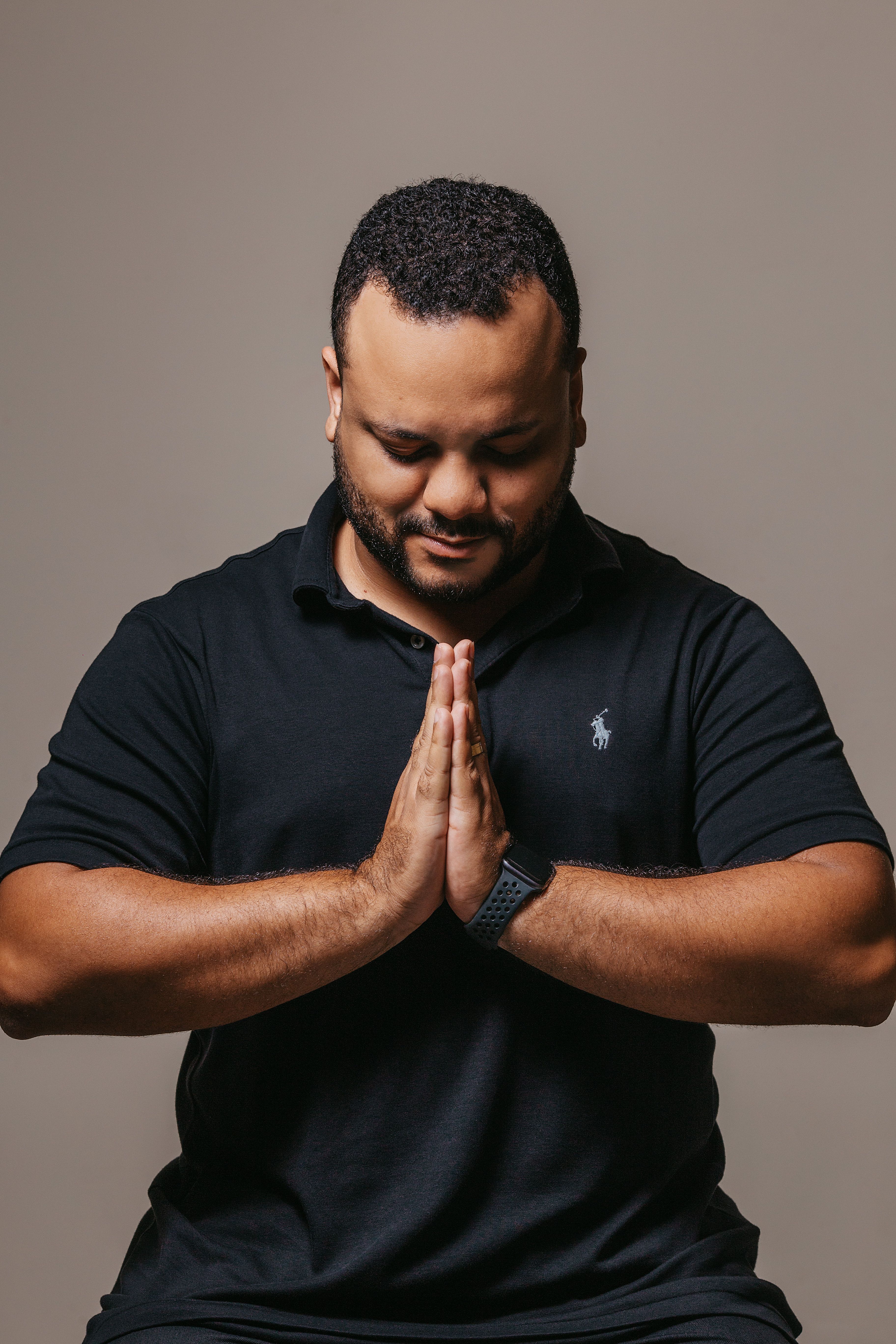 Stylish ethnic man posing on camera · Free Stock Photo
