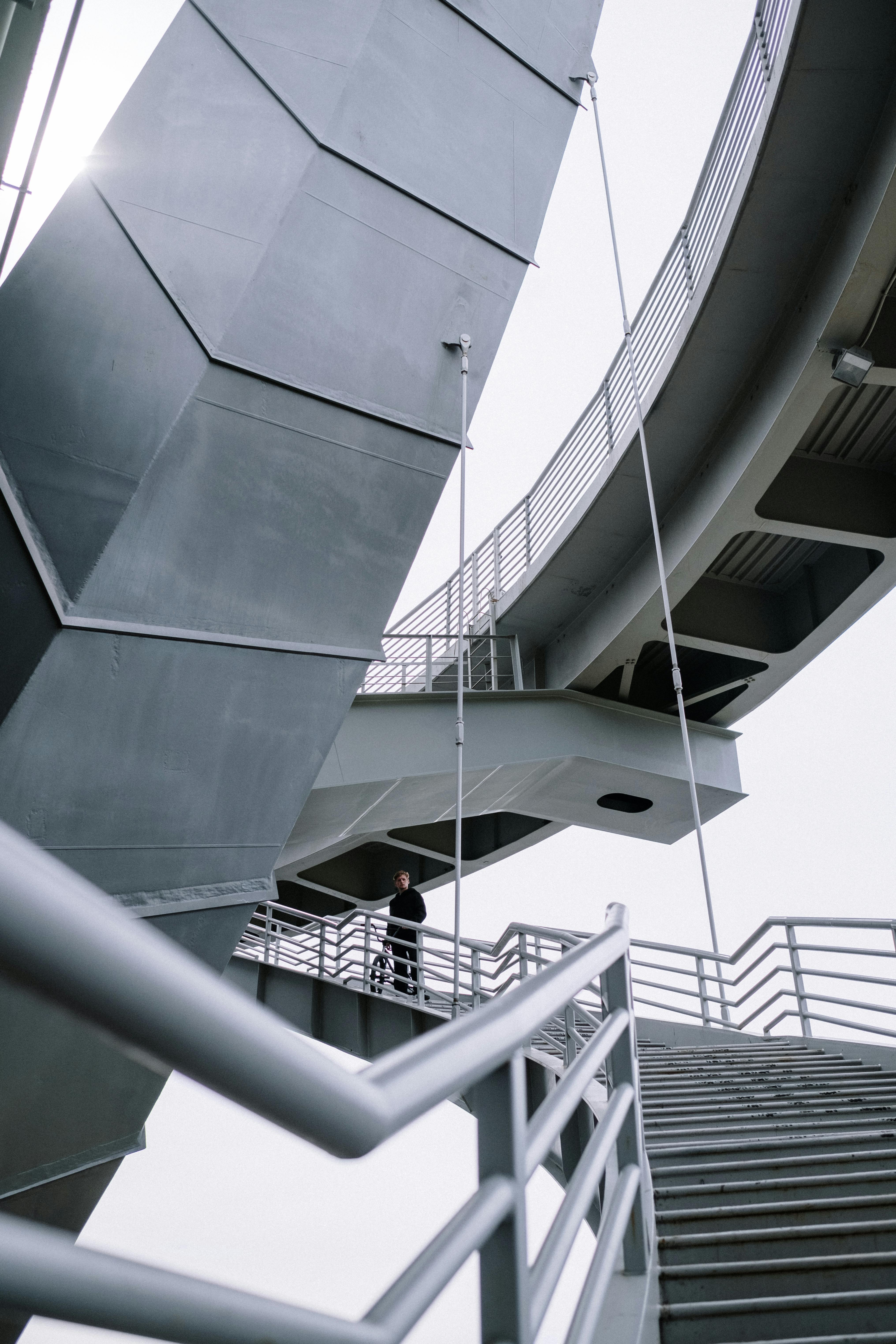 Metal Staircase Under a Bridge · Free Stock Photo