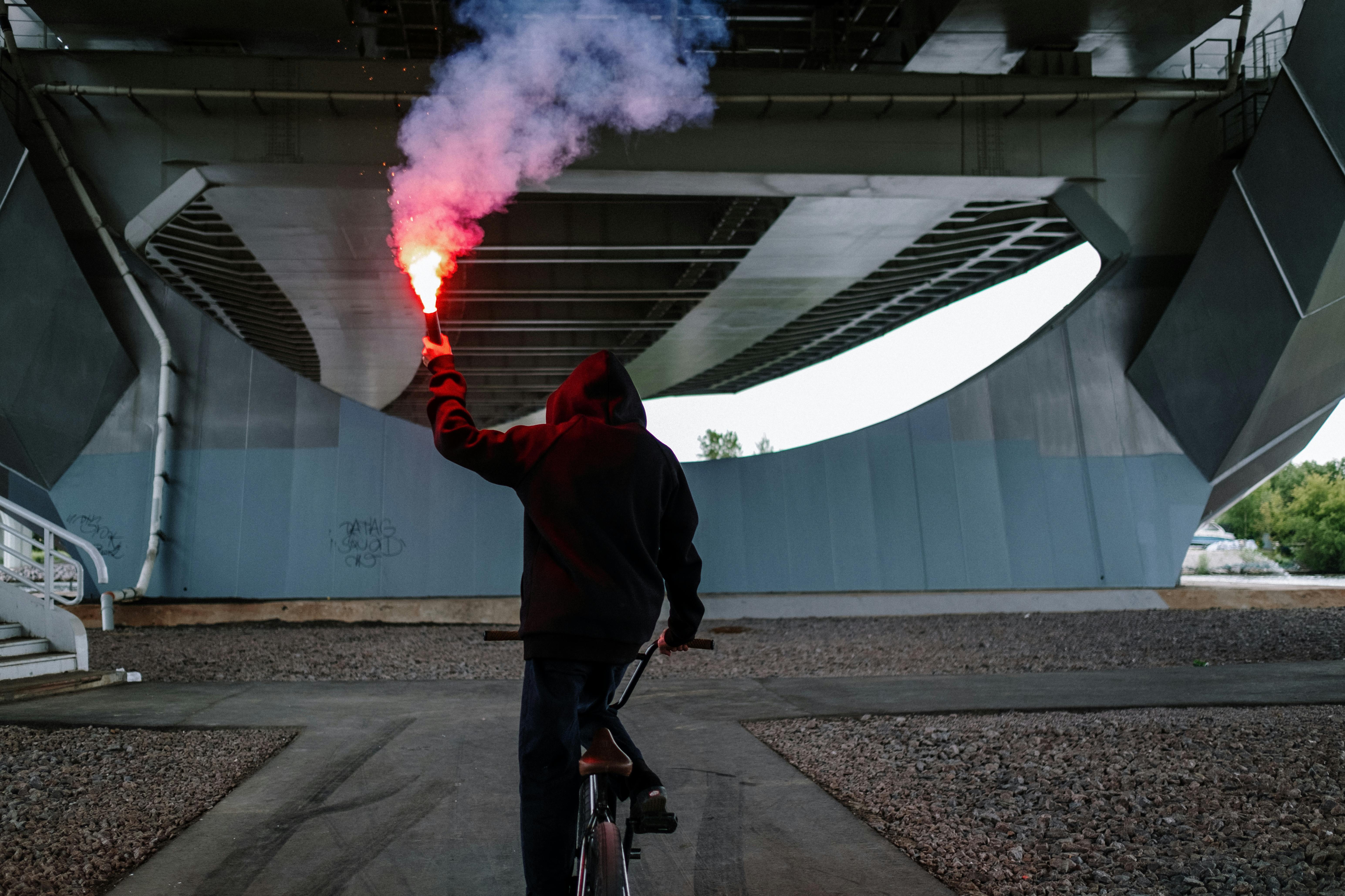 A Man Holding a Flare · Free Stock Photo