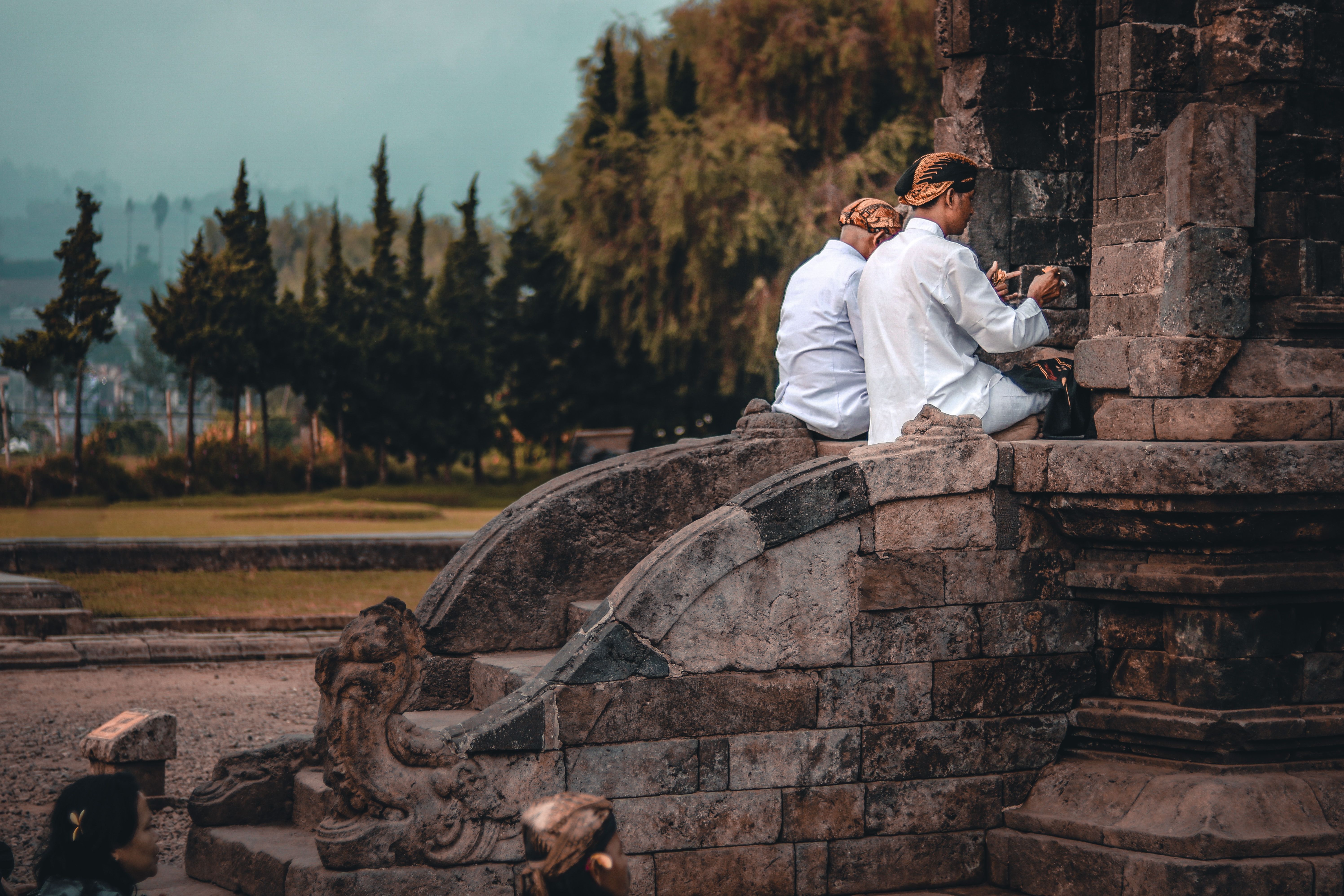 Anonymous Jewish man in traditional wear praying near old wall · Free ...