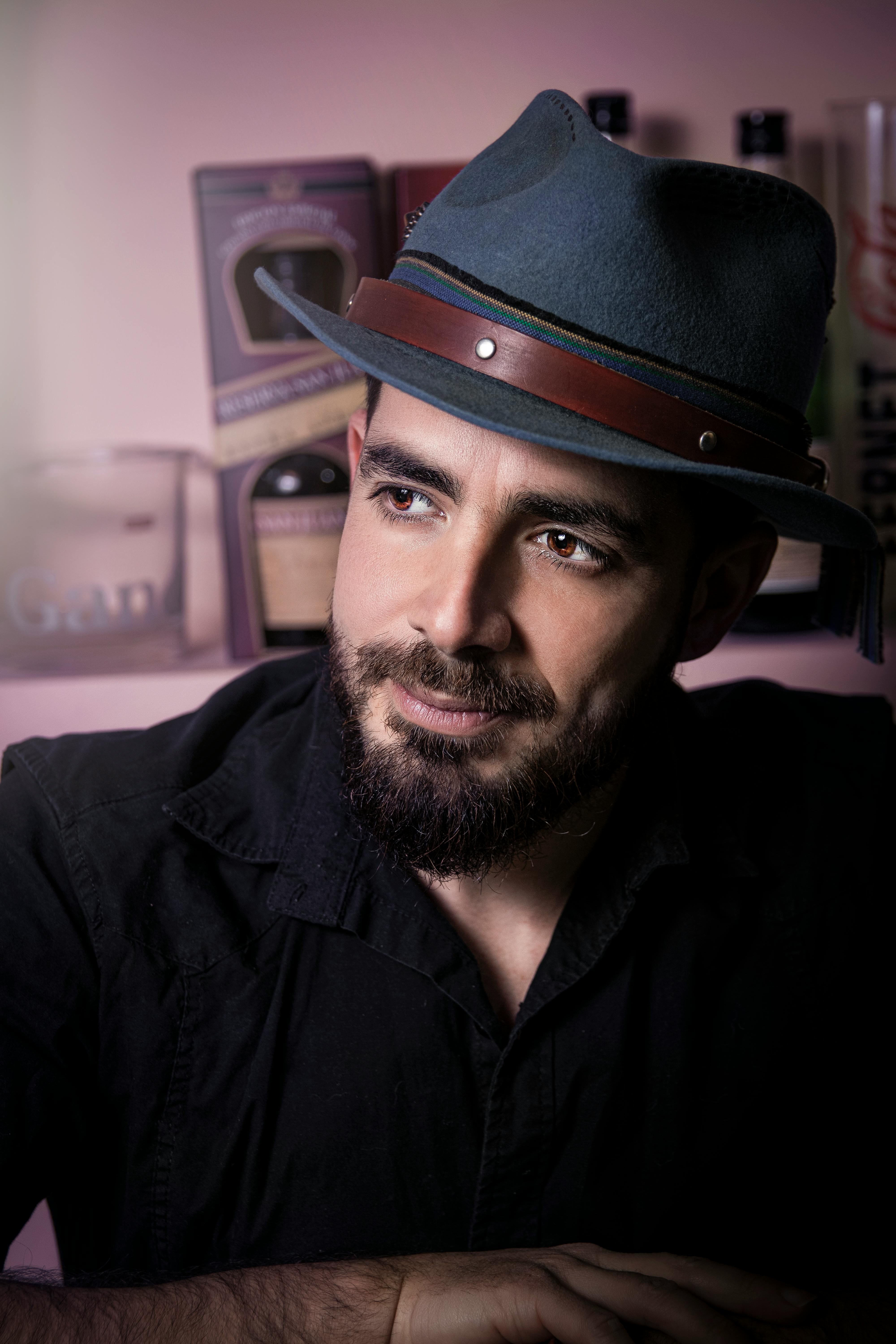 Portrait of a Man Wearing Fedora Hat · Free Stock Photo