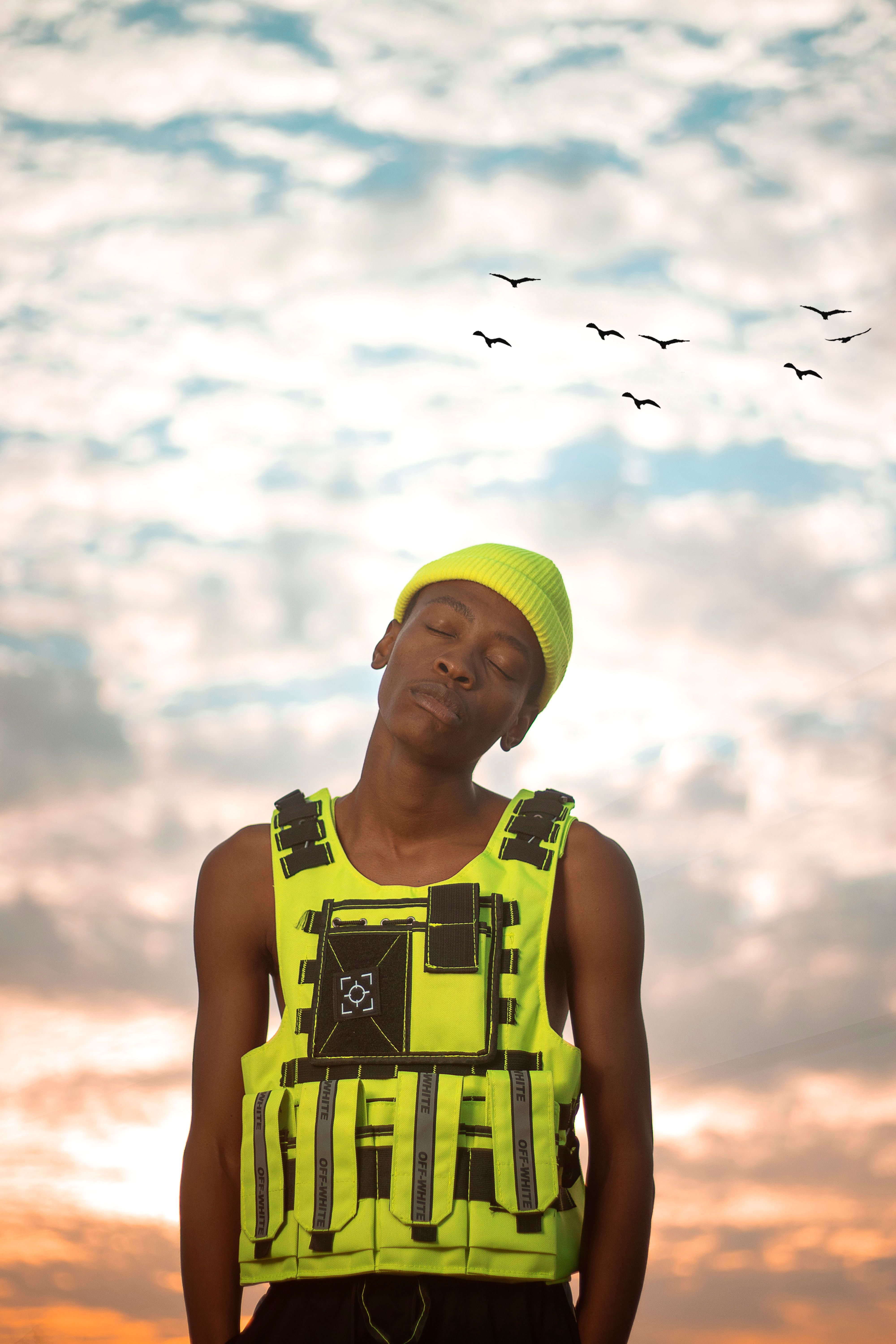 Man Wearing Yellow Vest and Yellow Beanie · Free Stock Photo