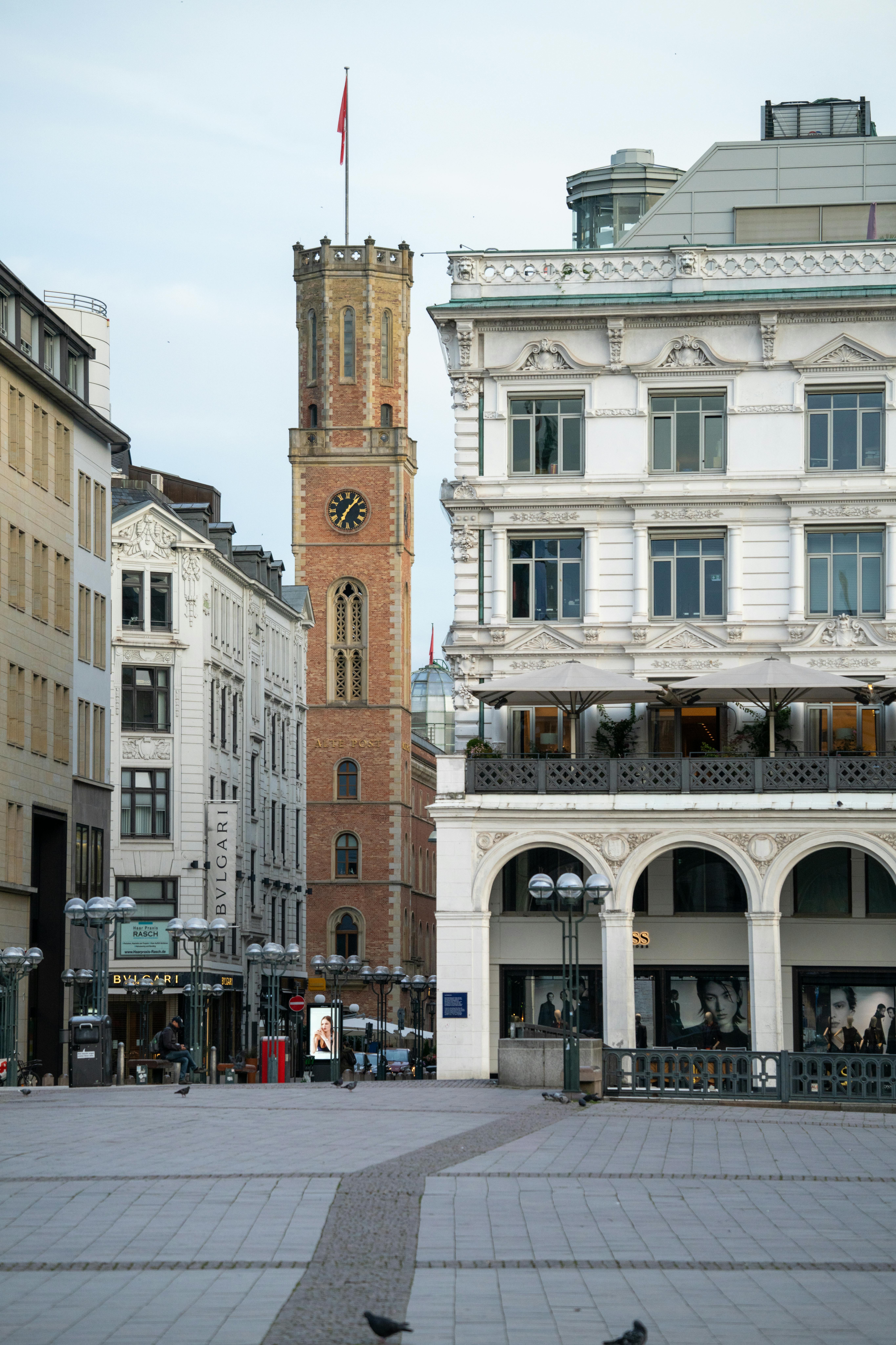 Old city square with clock tower · Free Stock Photo