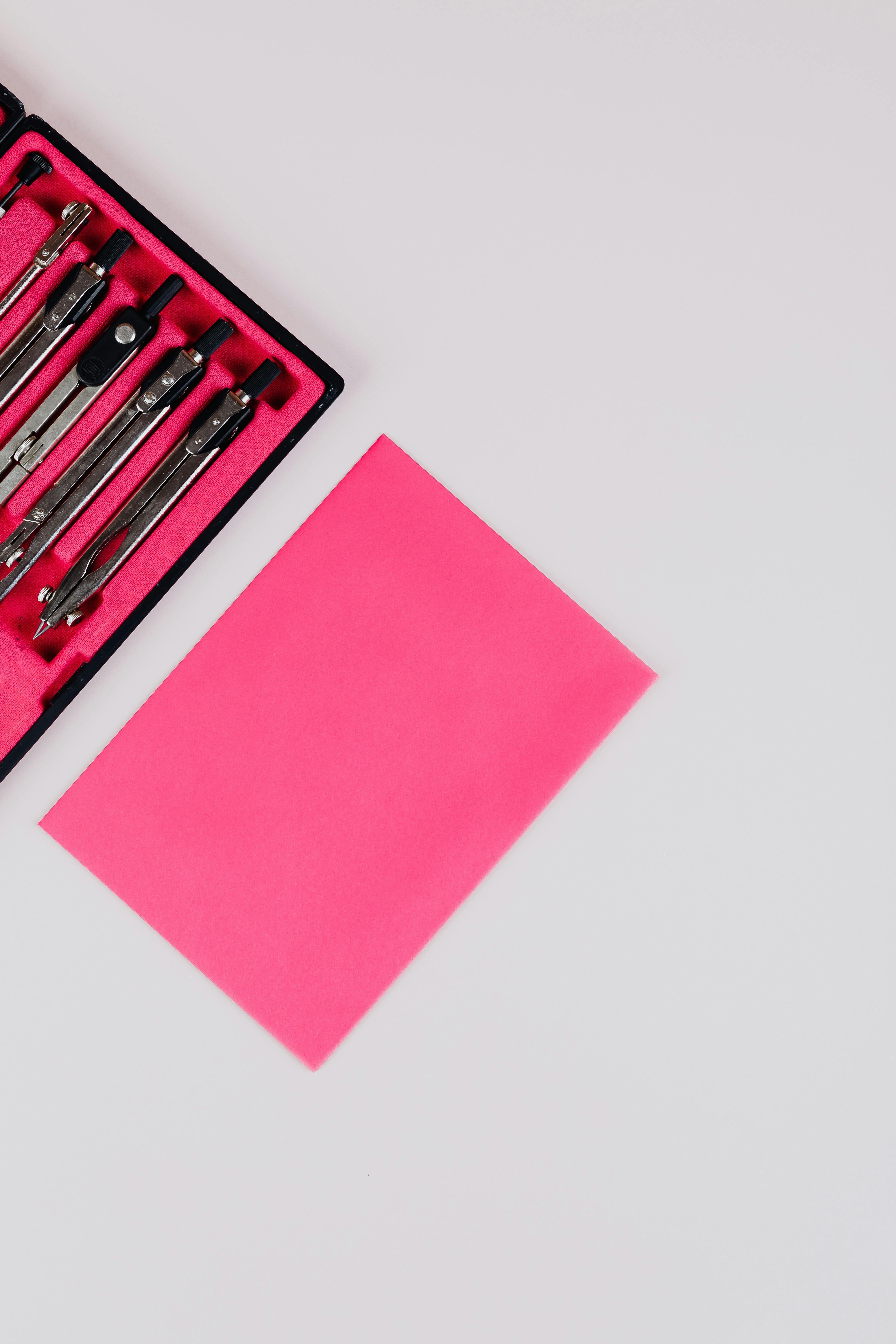 Set of Calipers in Pink Box on White Background · Free Stock Photo
